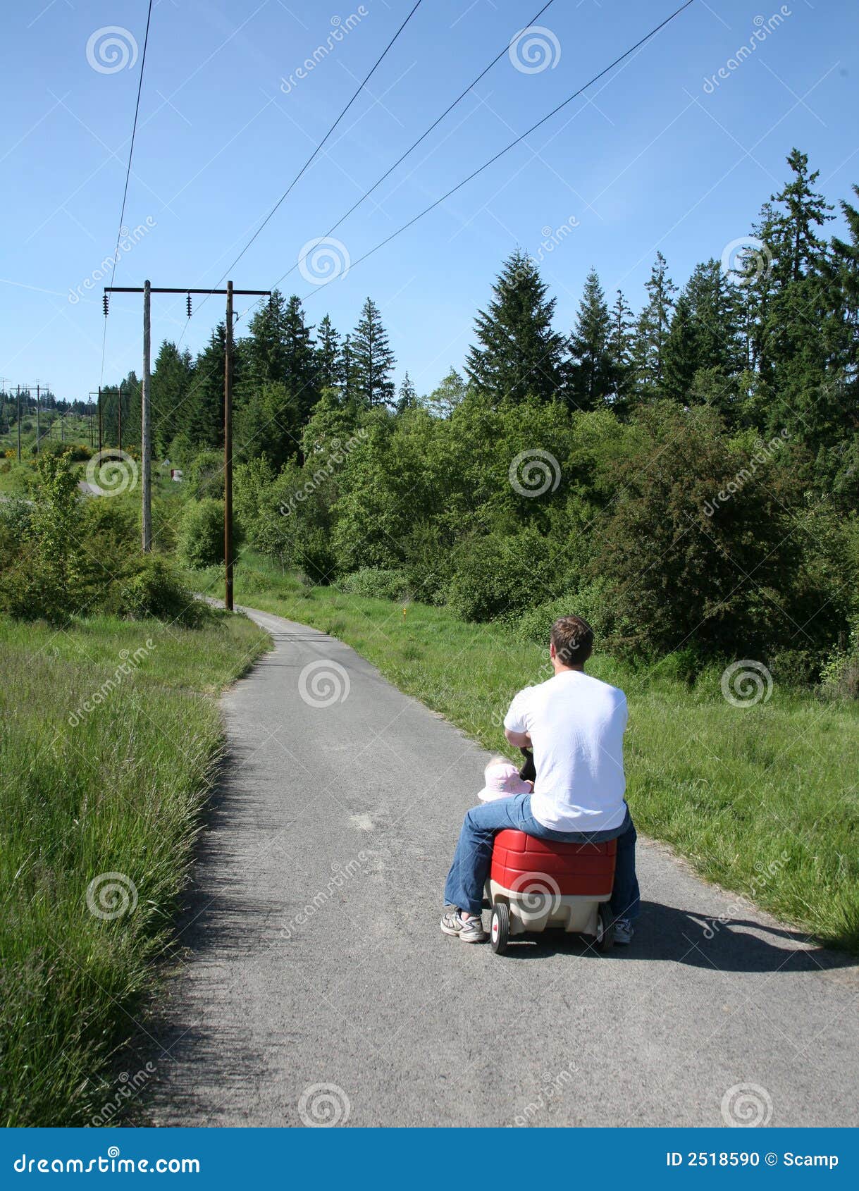 Dad and Kids in Wagon stock photo. Image of kids, fathers - 2518590
