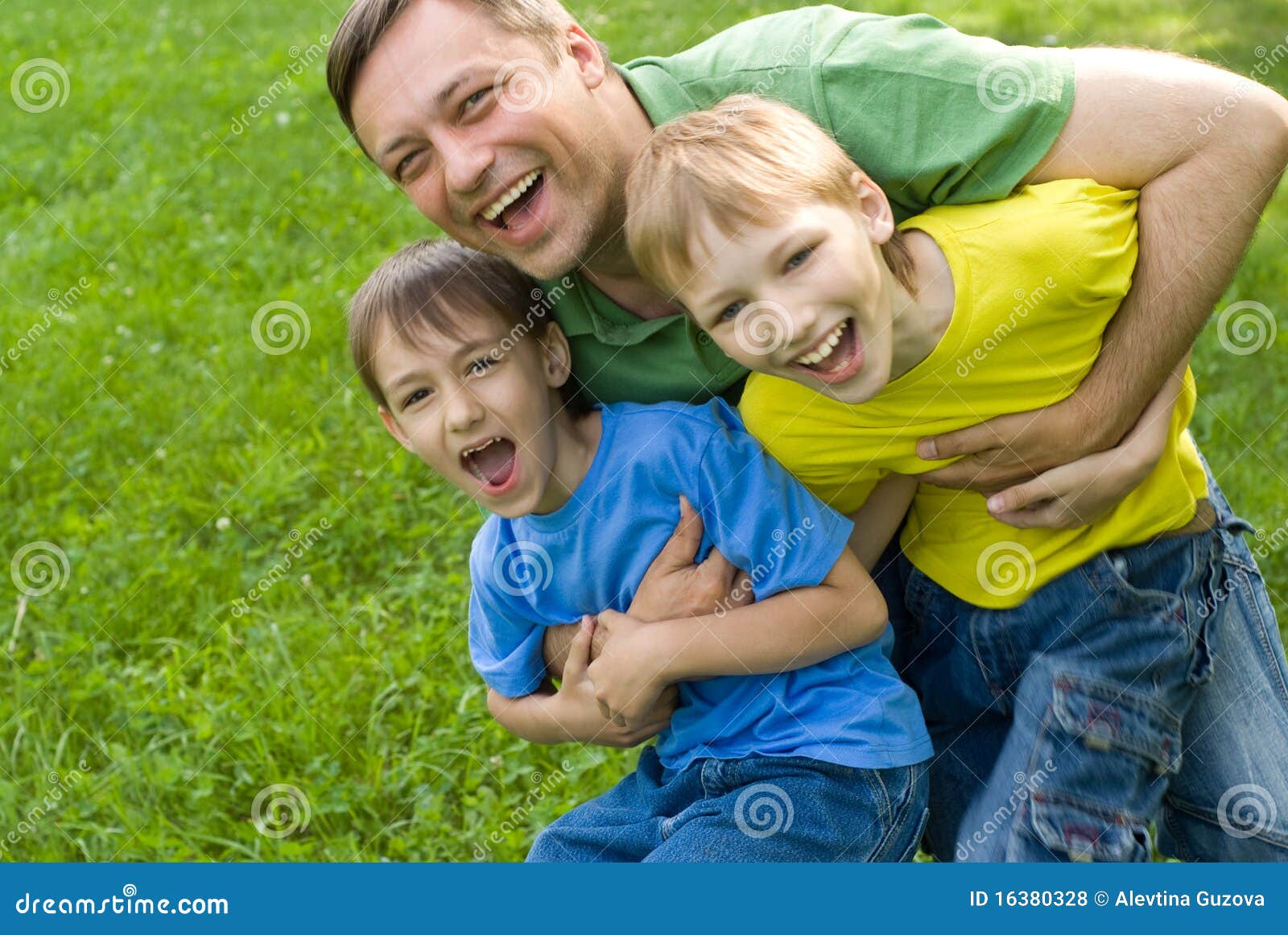 Dad Plays with Young Children Stock Photo - Image of adult, outdoors ...