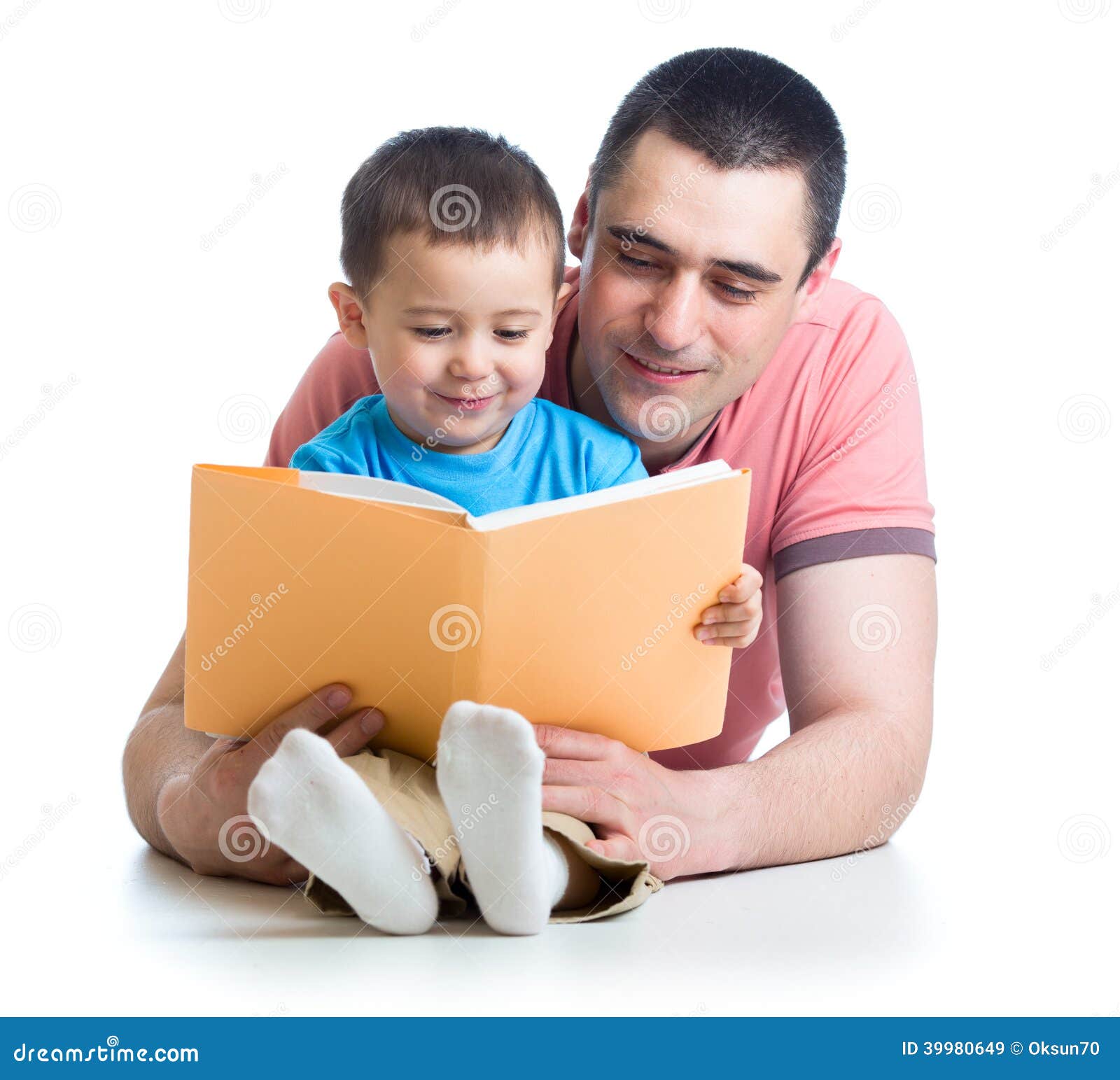 Dad reading a book to kid stock image. Image of childhood - 39980649