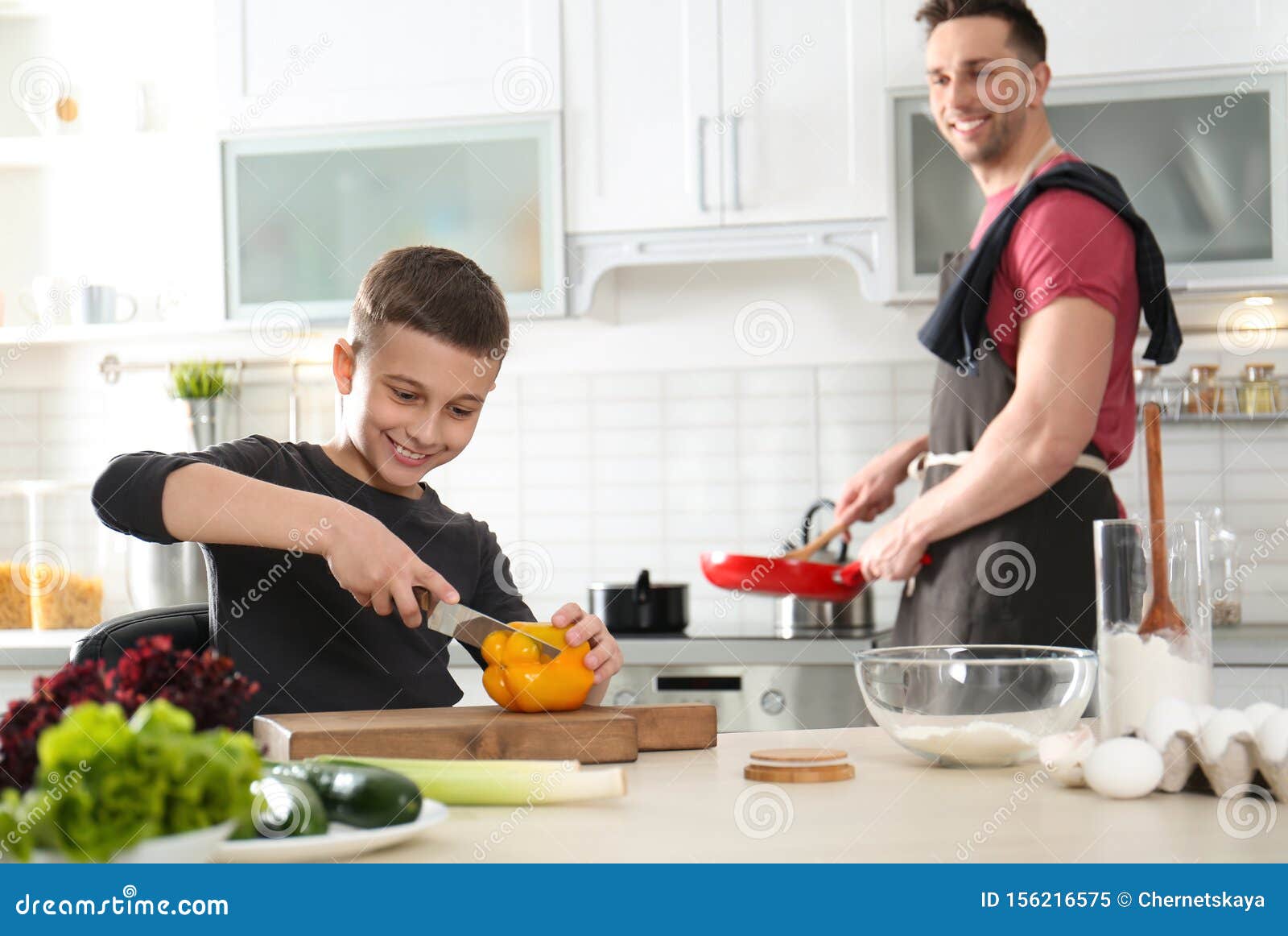 Dad and Son Cooking Together in Stock Image - Image of lifestyle, flour ...