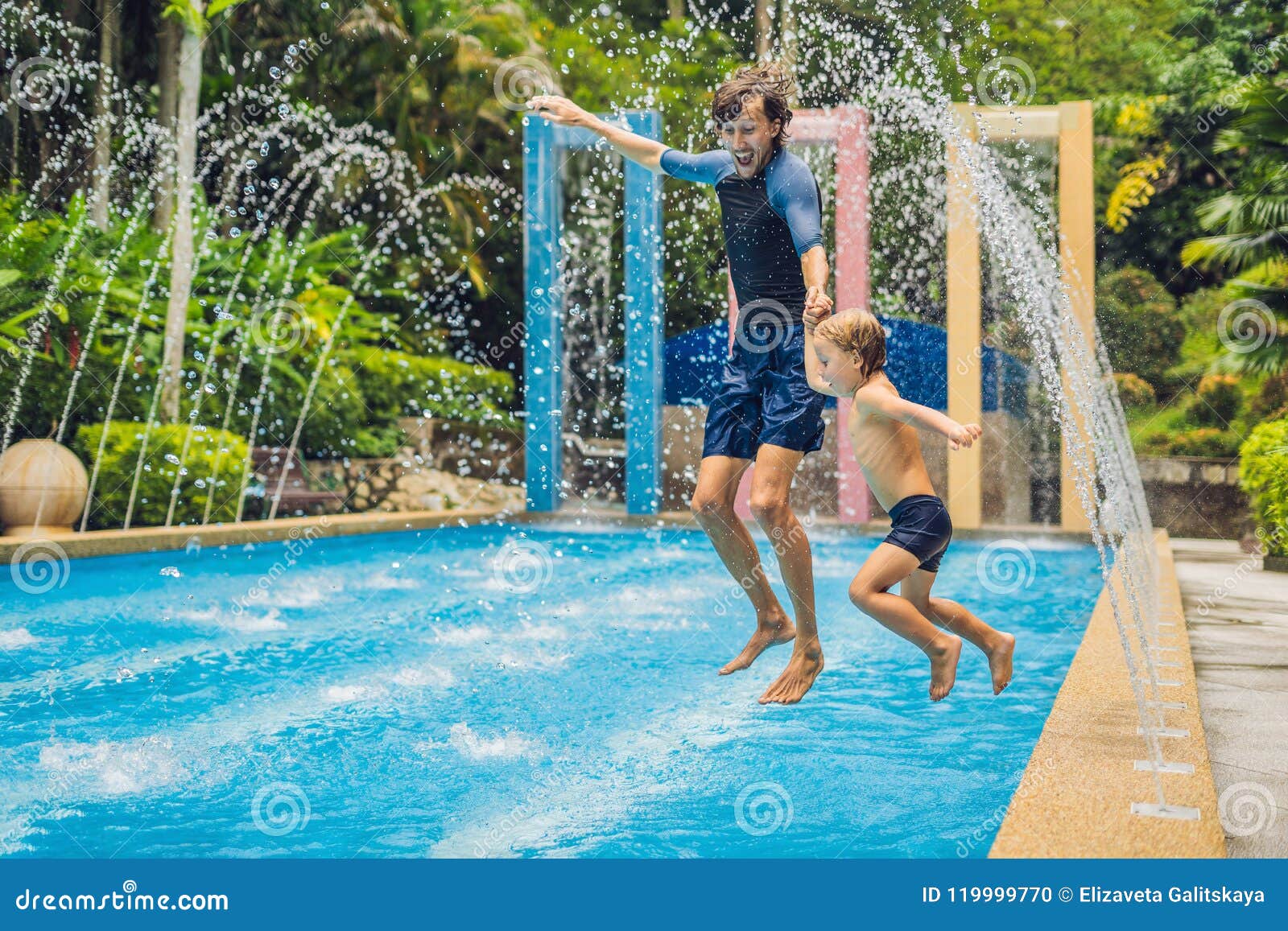 Dad and Son Have Fun in the Pool Stock Photo - Image of resort ...