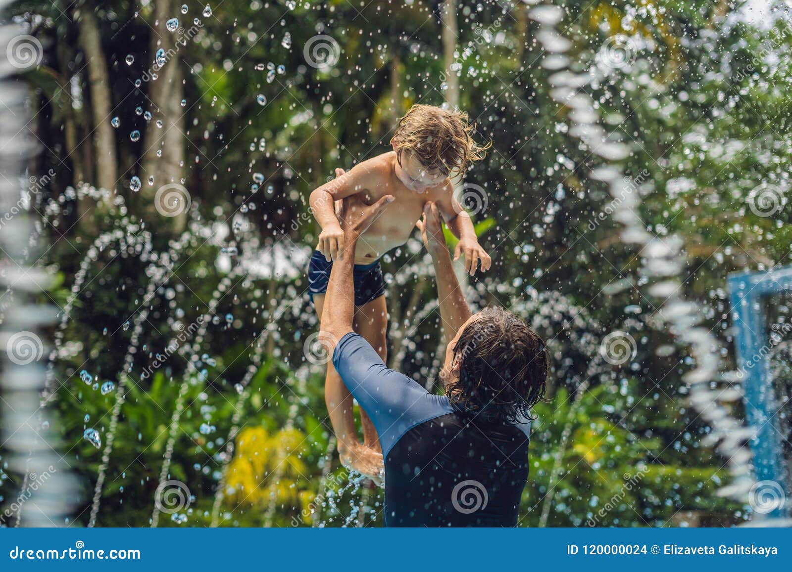 Dad and Son Have Fun in the Pool Stock Photo - Image of cute, outside ...
