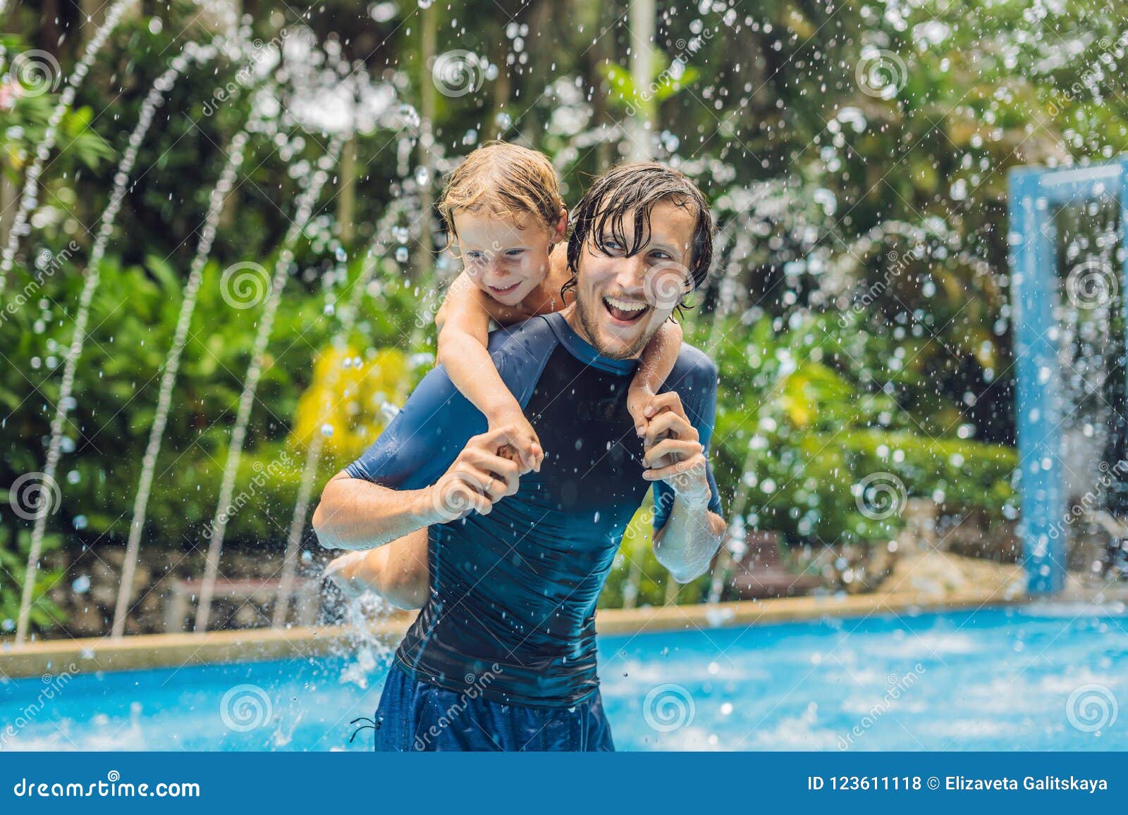 Dad and Son Have Fun in the Pool Stock Photo - Image of child, healthy ...