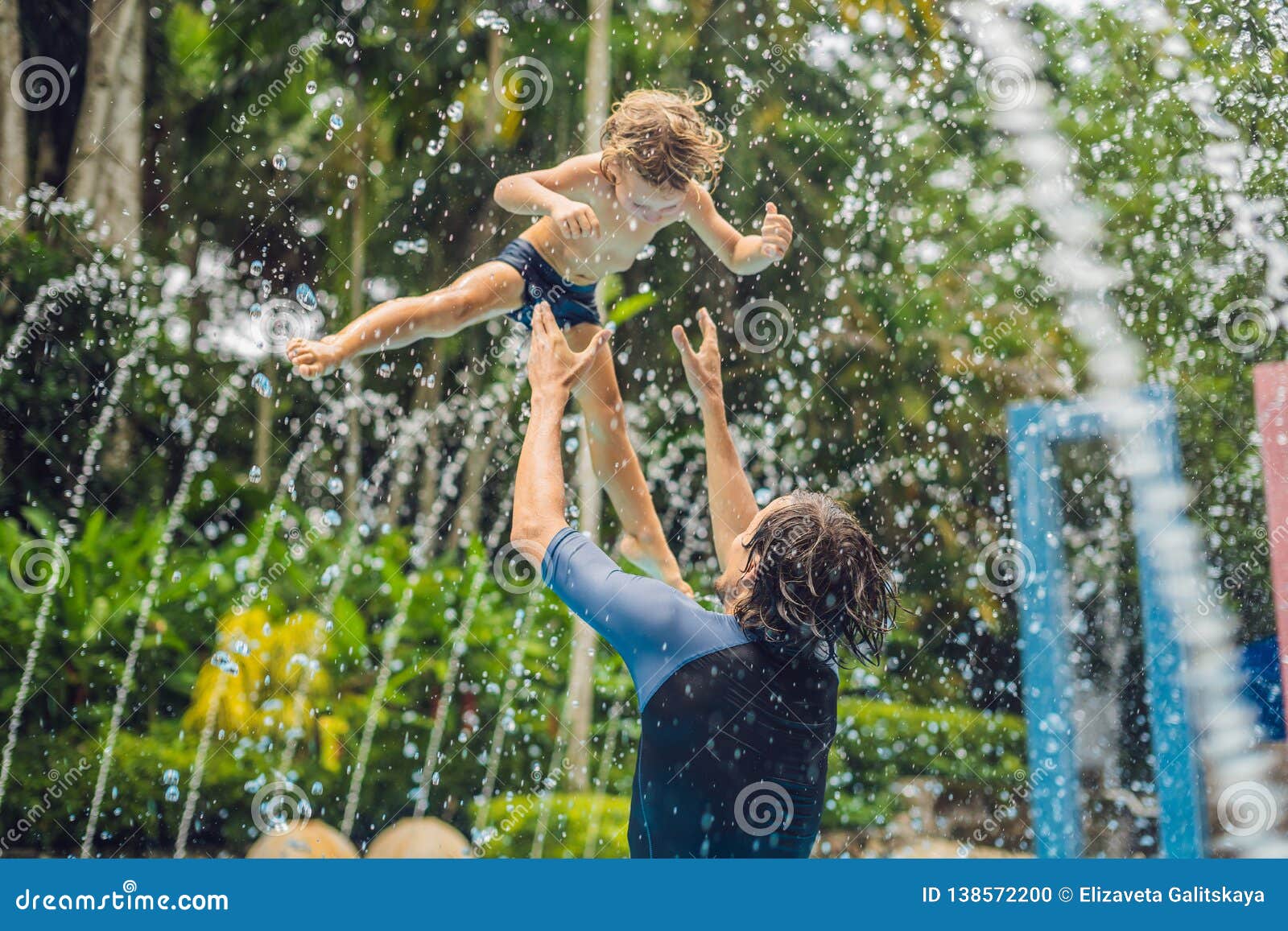 Dad and Son Have Fun in the Pool Stock Photo - Image of game, beautiful ...