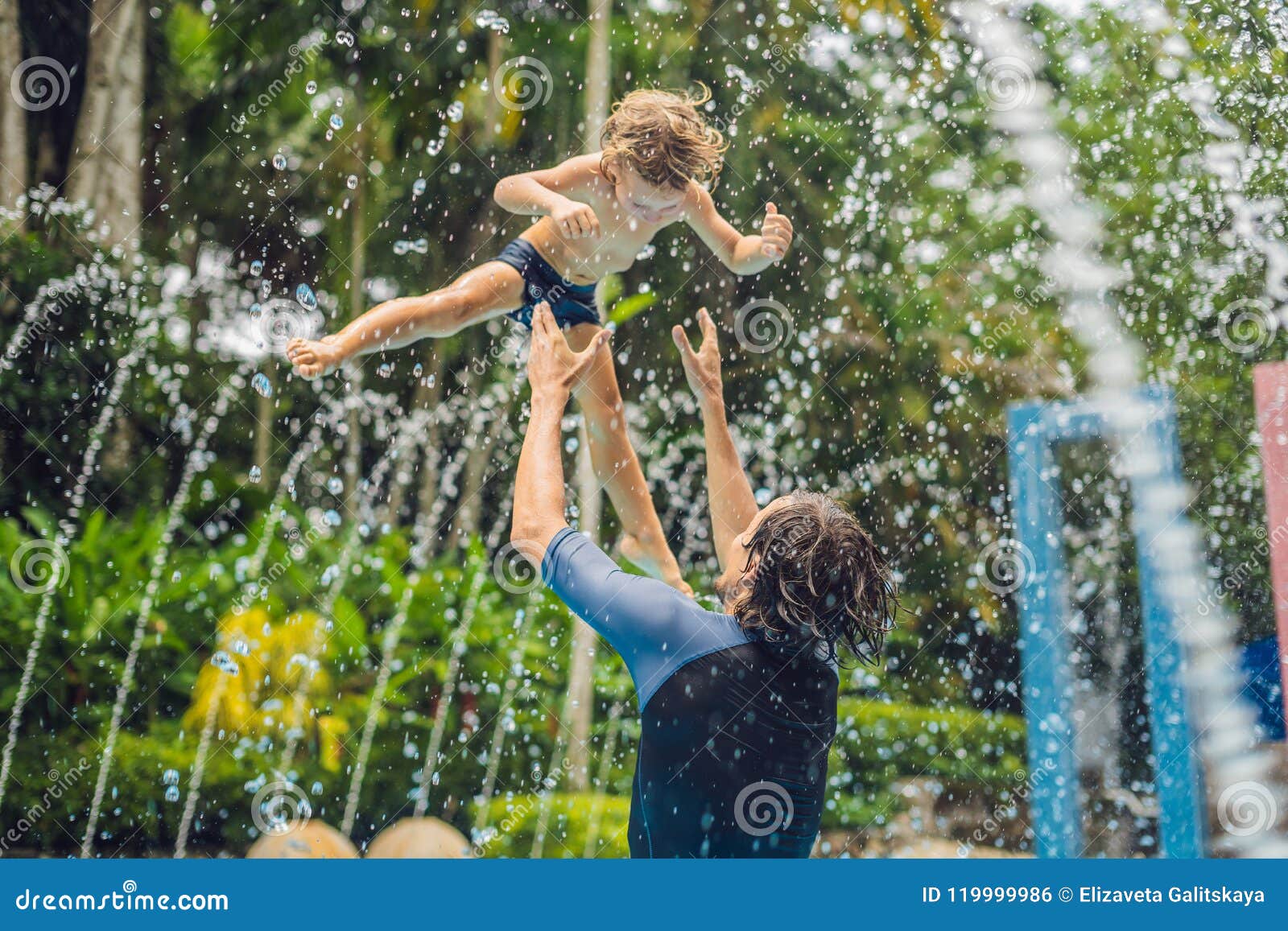 Dad and Son Have Fun in the Pool Stock Photo - Image of parenting ...