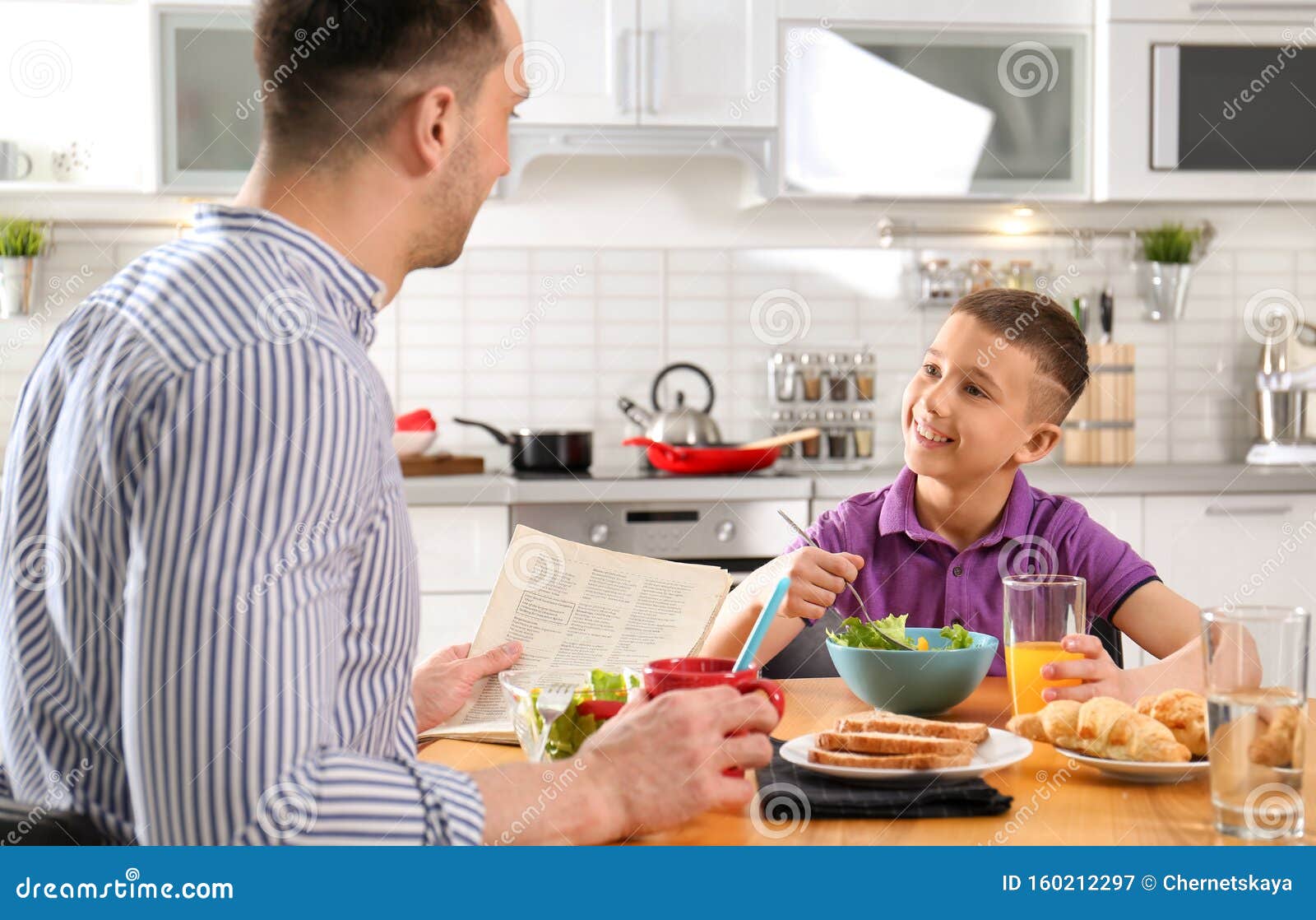 Dad And Son Having Breakfast Together Stock Image - Image of childhood ...