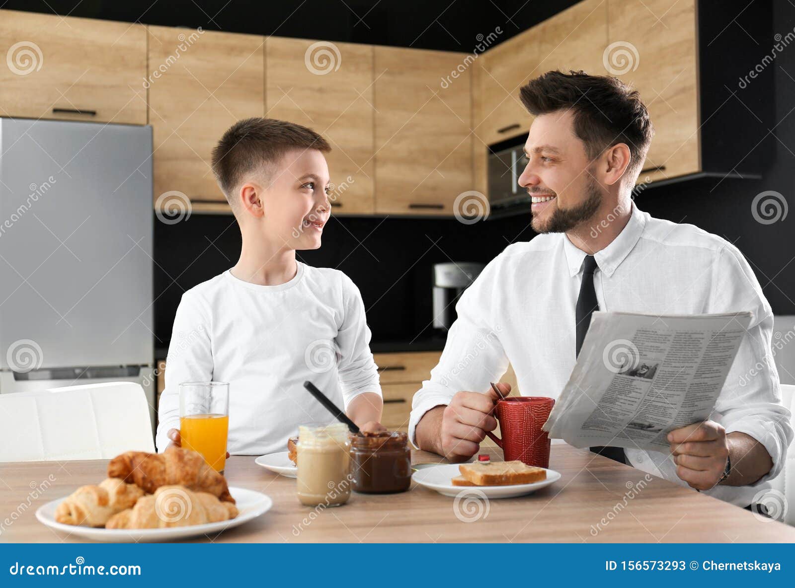 Dad and Son Having Breakfast Together Stock Image - Image of interior ...