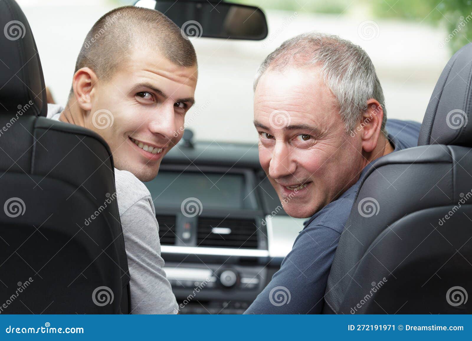 Dad and Son Looking Back and Smiling Stock Image - Image of travel ...