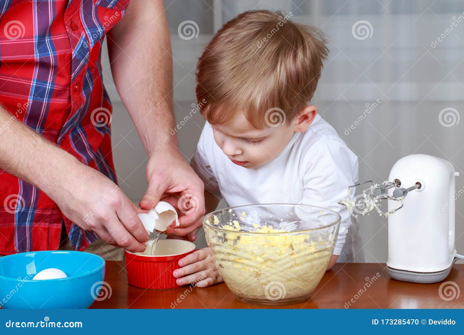 Dad and son make dough stock photo. Image of cooking - 173285470