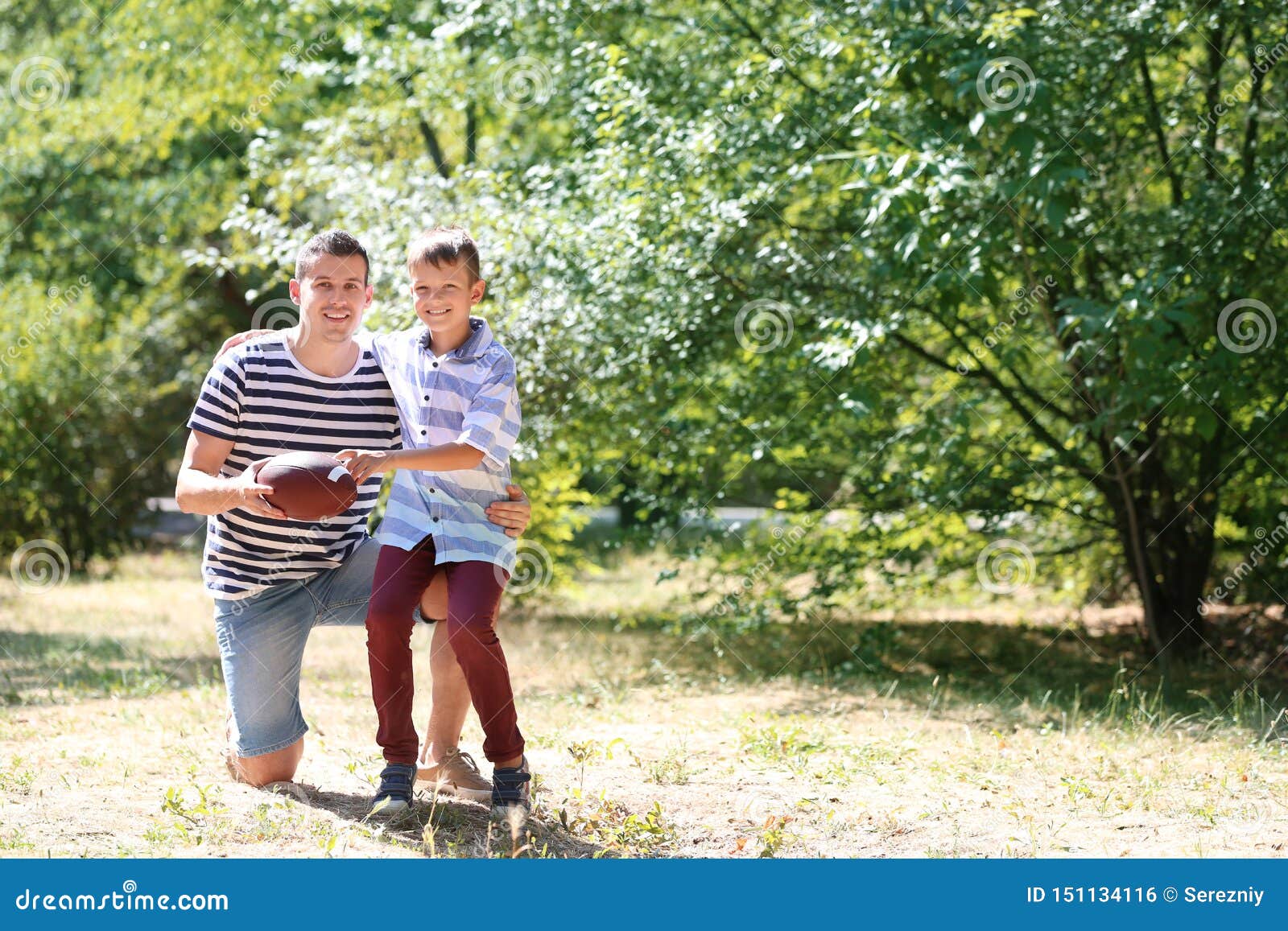 Dad and Son with Rugby Ball Outdoors Stock Photo - Image of goal ...
