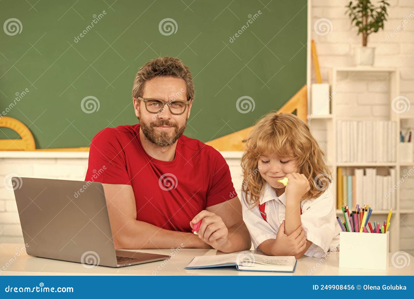 Dad and Son Study in Classroom with Laptop, School Online Stock Photo ...