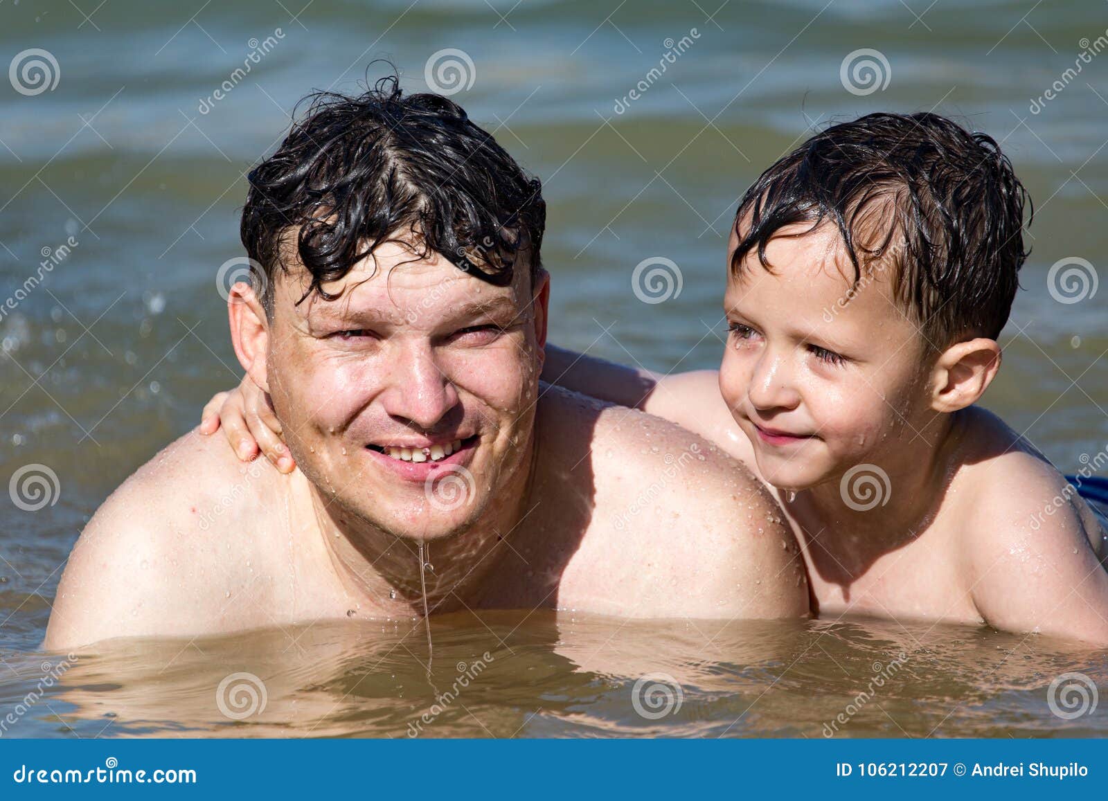 Dad and Son Swimming in the Lake Stock Image - Image of smile, family ...