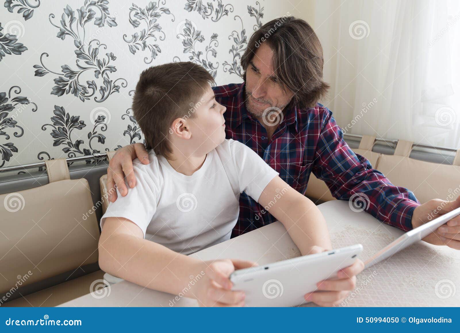 Dad and Son with Tablet Computer Indoor Stock Photo - Image of adorable ...