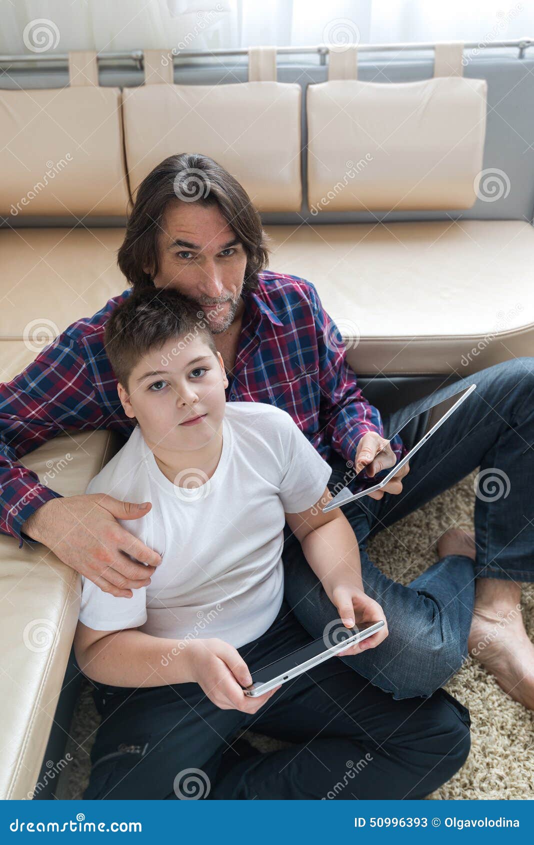 Dad and Son with Tablet Computer Indoor Stock Image - Image of ...