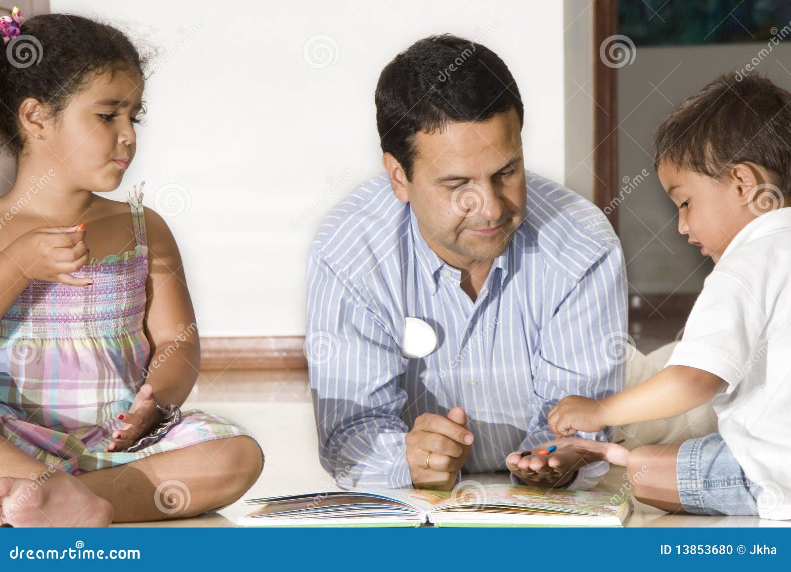 Dad teaching children stock photo. Image of couple, european - 13853680