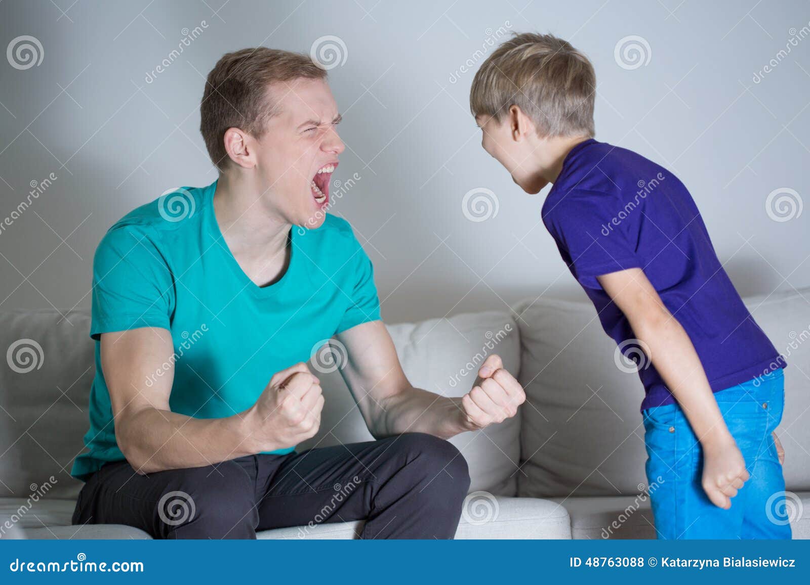 Dad yelling at his son stock photo. Image of quarrel - 48763088