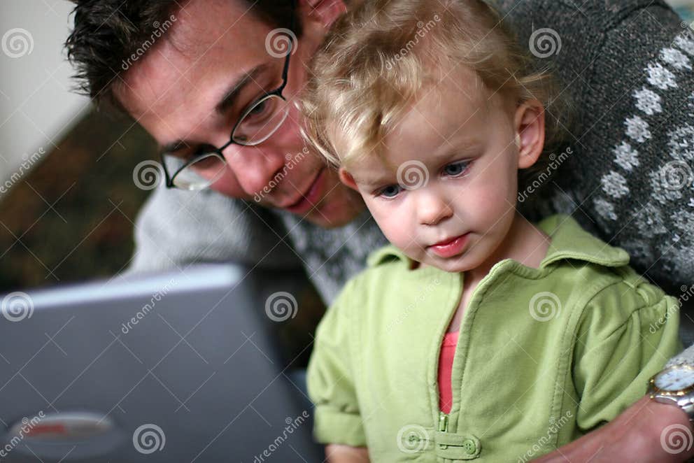 Daddy and Baby at Computer stock image. Image of teach - 2762409