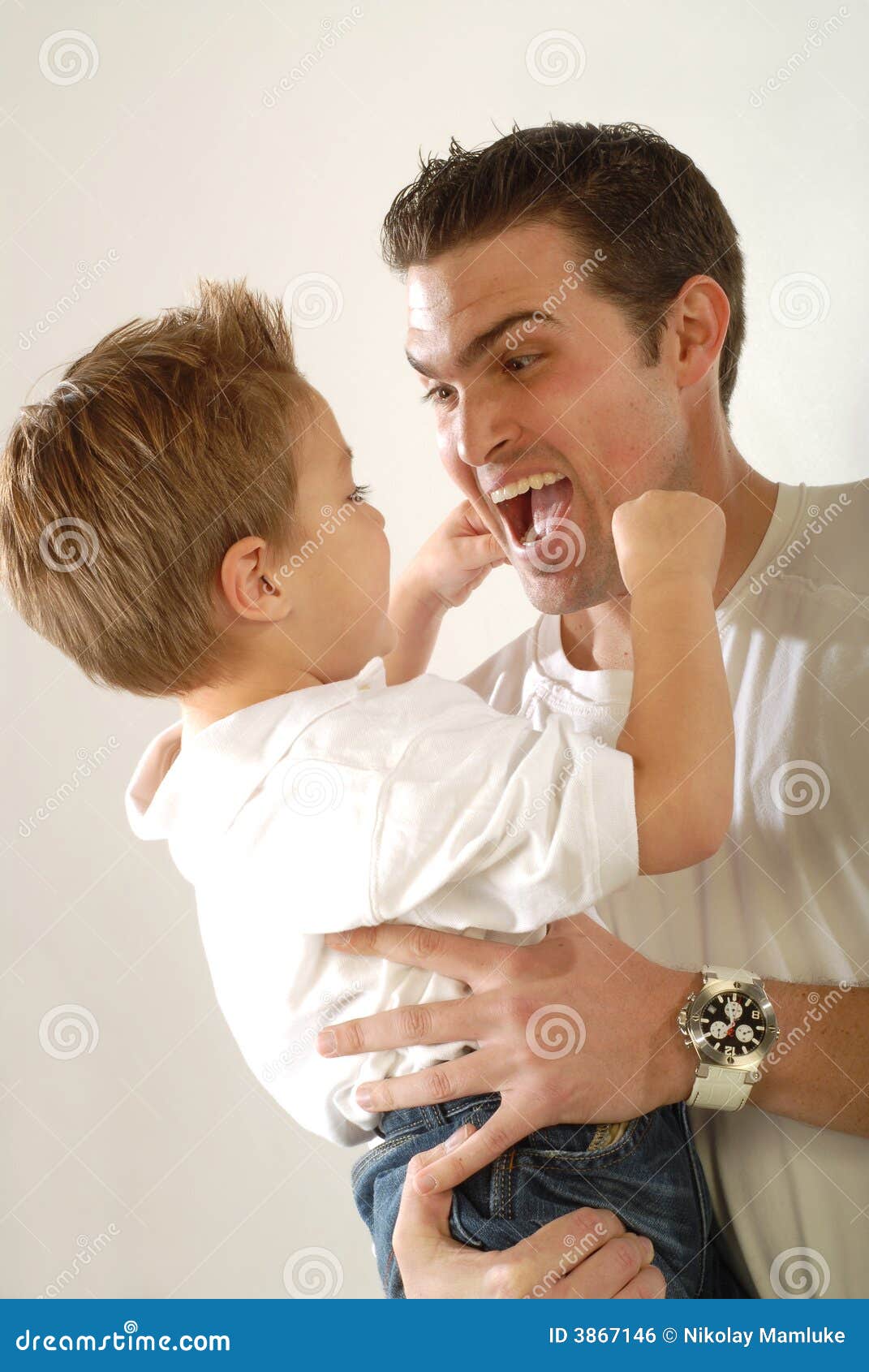 Daddy being silly stock photo. Image of bonding, energy - 3867146
