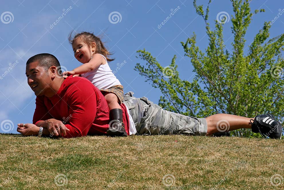 Daddy s Back stock image. Image of blue, families, family - 1022879