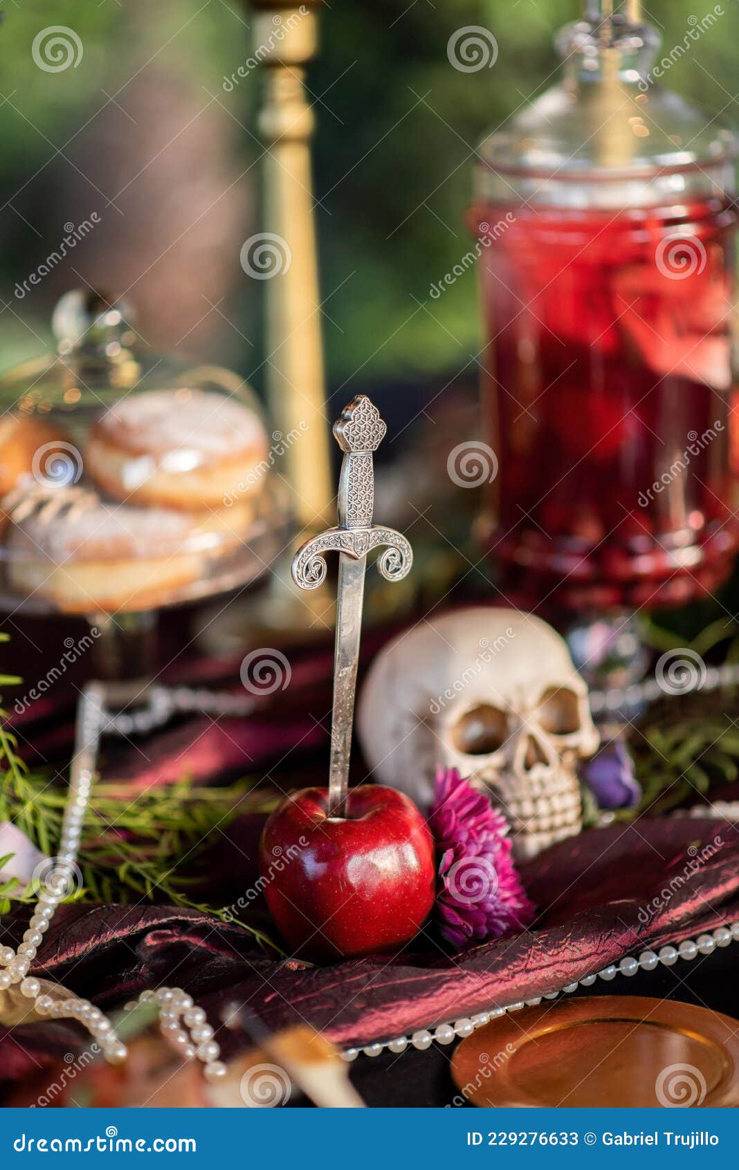 Dagger in Apple on Table Prepared for Halloween Stock Image - Image of ...