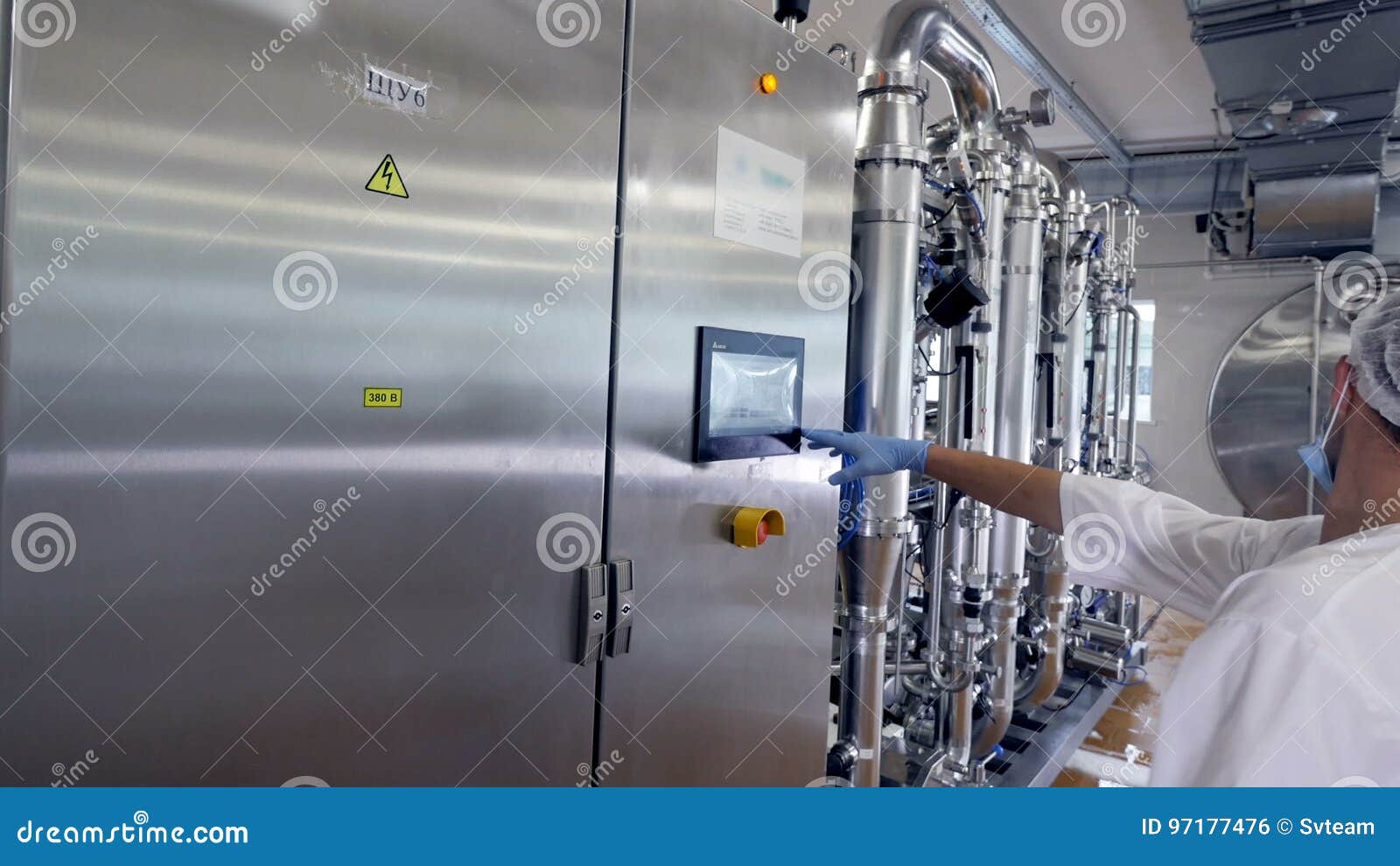 A Dairy Factory Worker Using a Touch Screen Equipment. Stock Footage ...