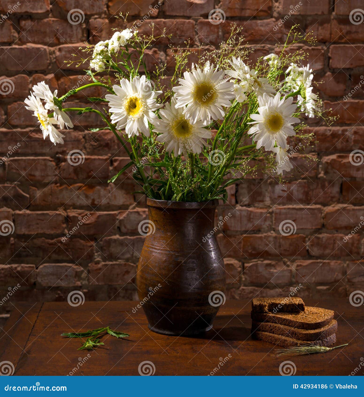 Daisies in Vase and Bakery Pieces of Bread Stock Photo - Image of bread ...