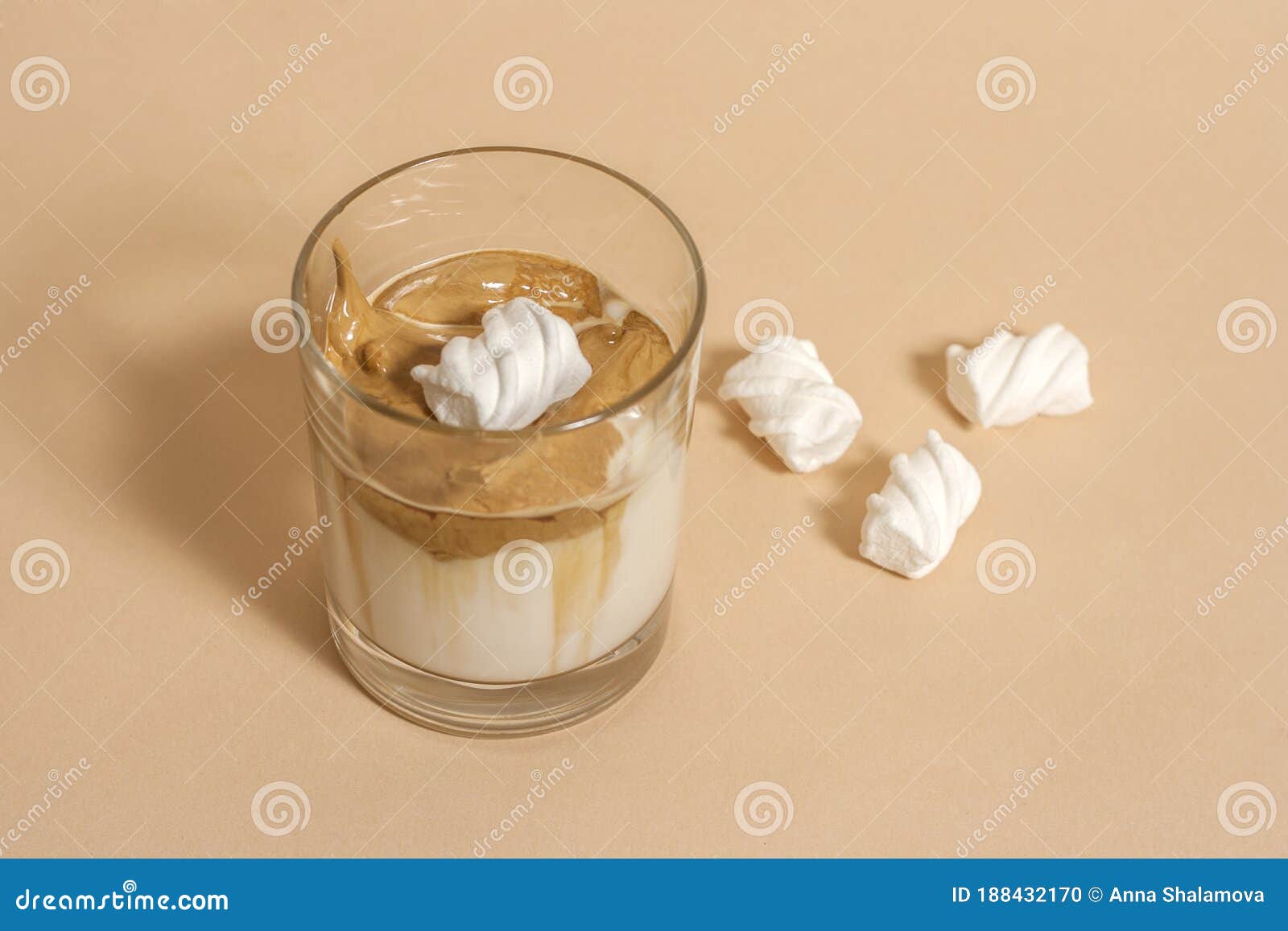 Dalgon Coffee in a Transparent Glass with Milk on a Pastel Background ...