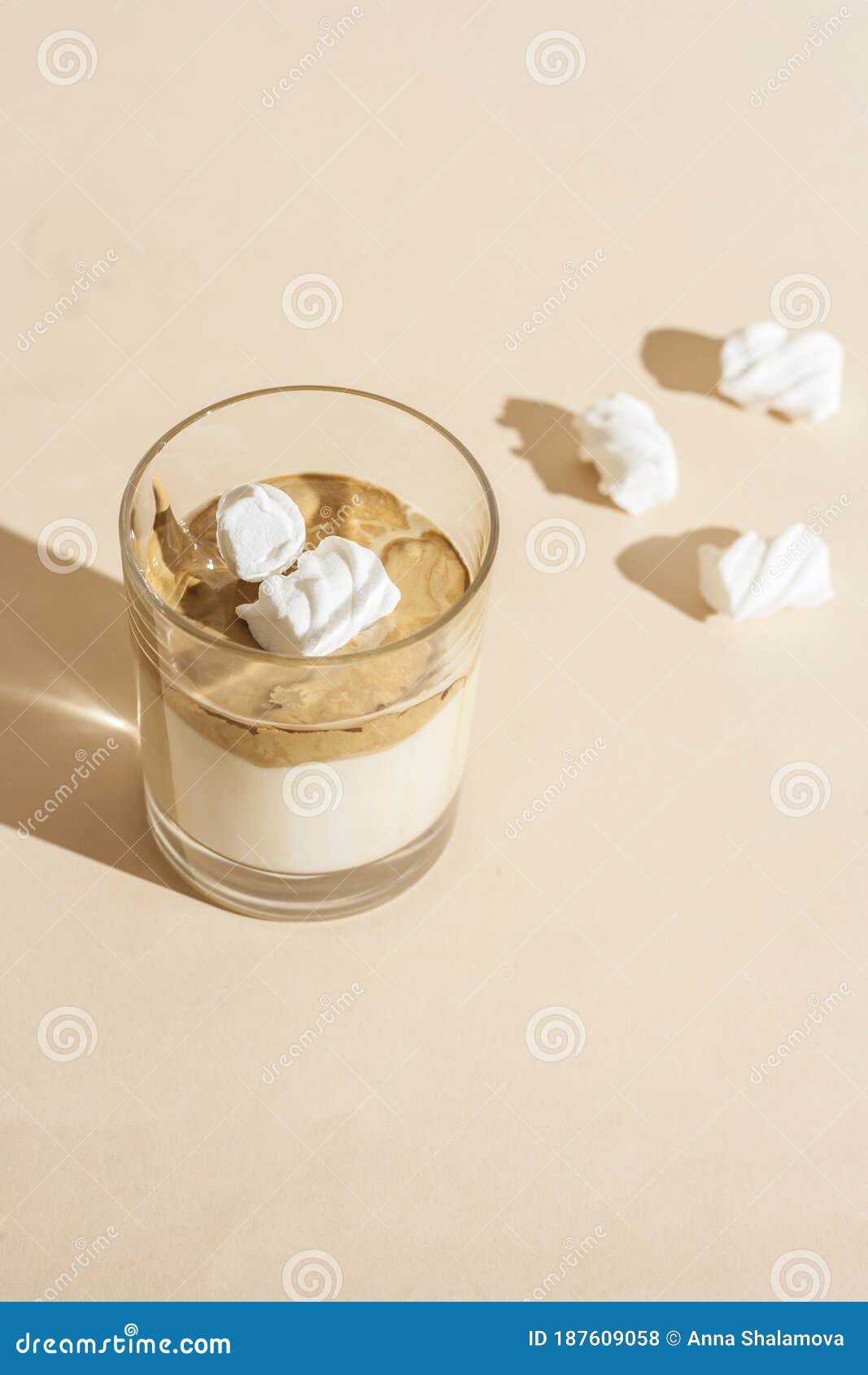 Dalgon Coffee in a Transparent Glass with Milk on a Pastel Background ...