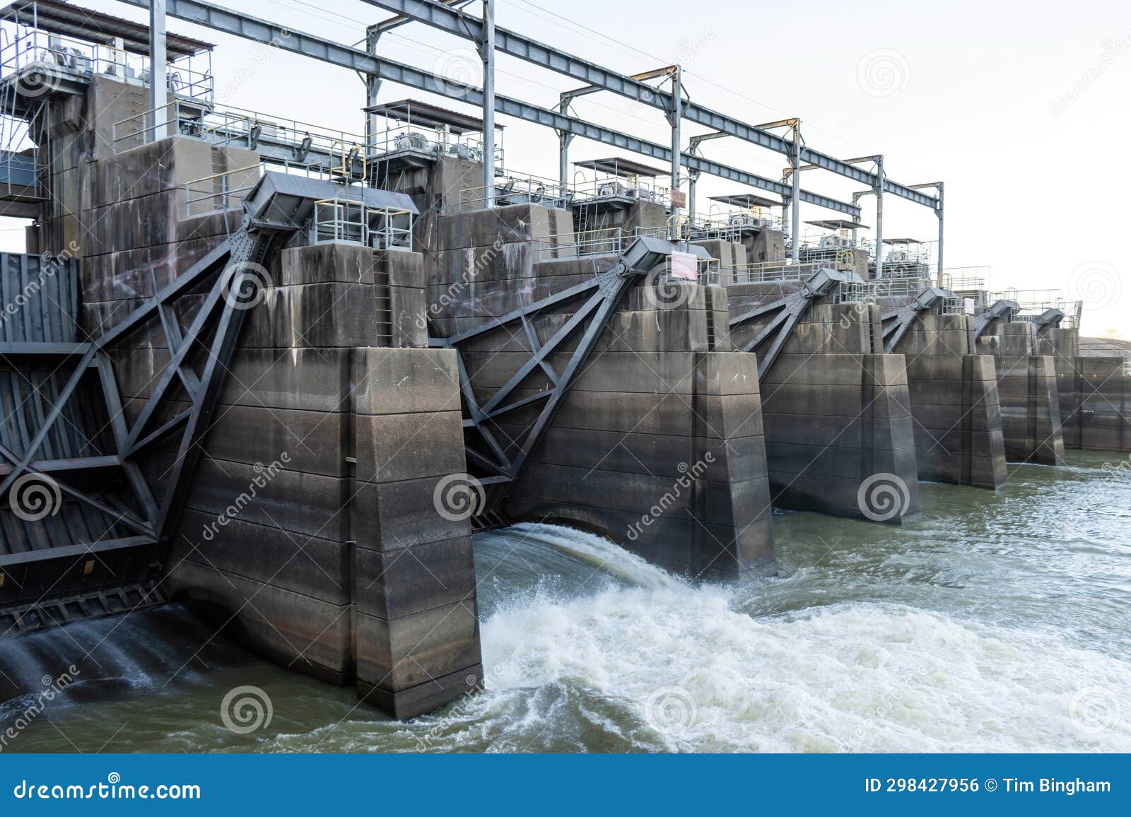 Dam Spillway Gate with Water Flowing through Stock Photo - Image of ...