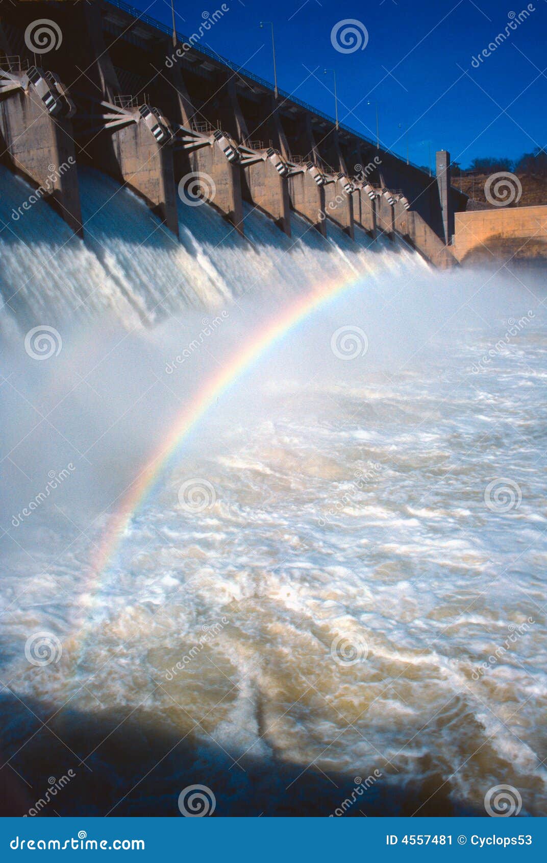Dam spillway with rainbow stock image. Image of flow, power - 4557481