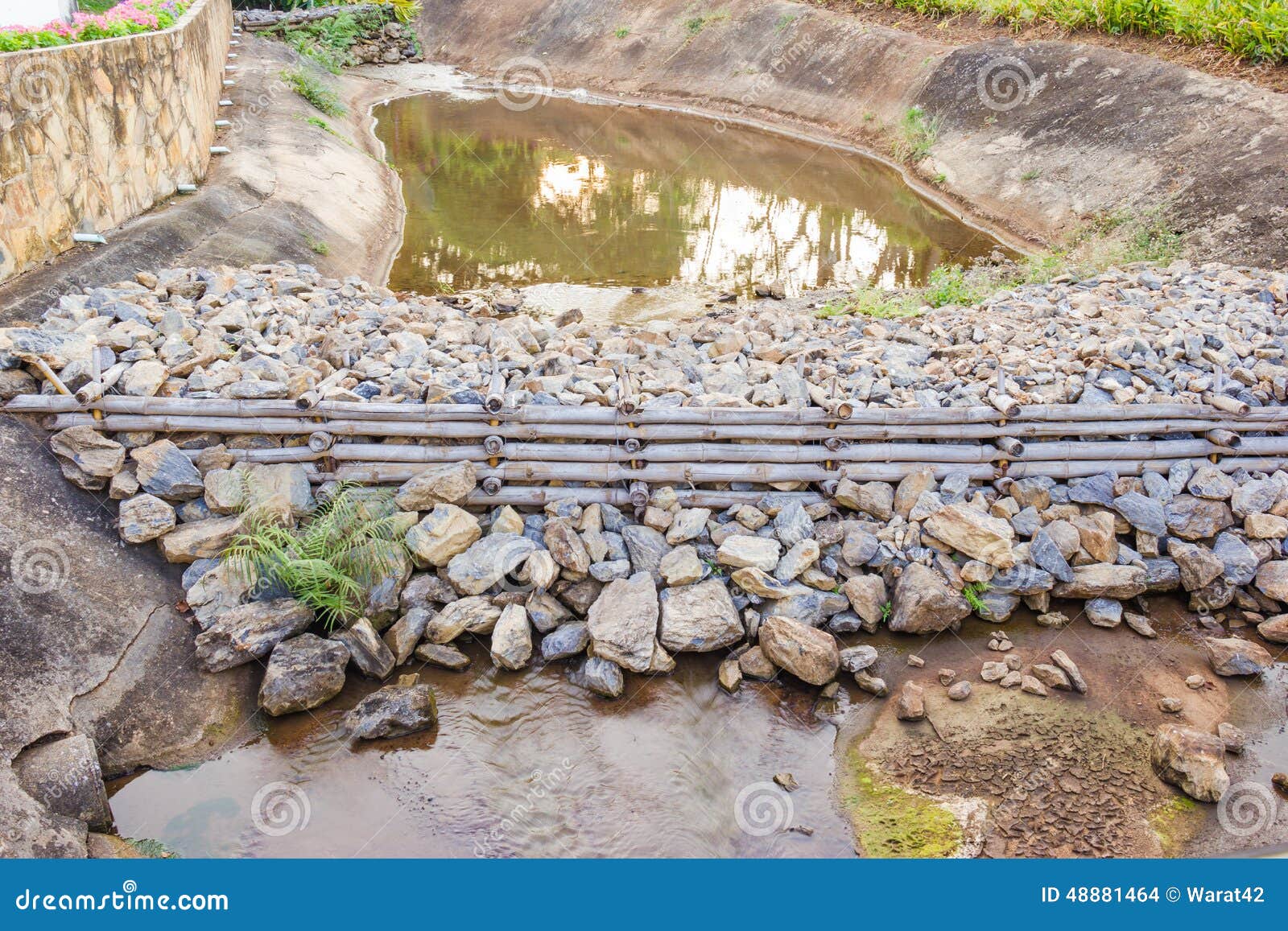 Dam To Slow Down the Flow of Water Stock Photo - Image of rock, wooden ...