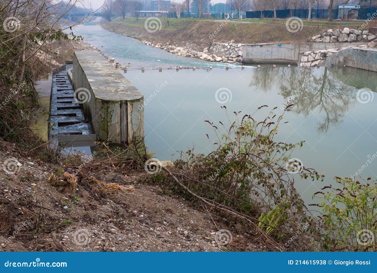 Dam View from Above: Small Rock Dam of a River in a Built-up Area Stock ...