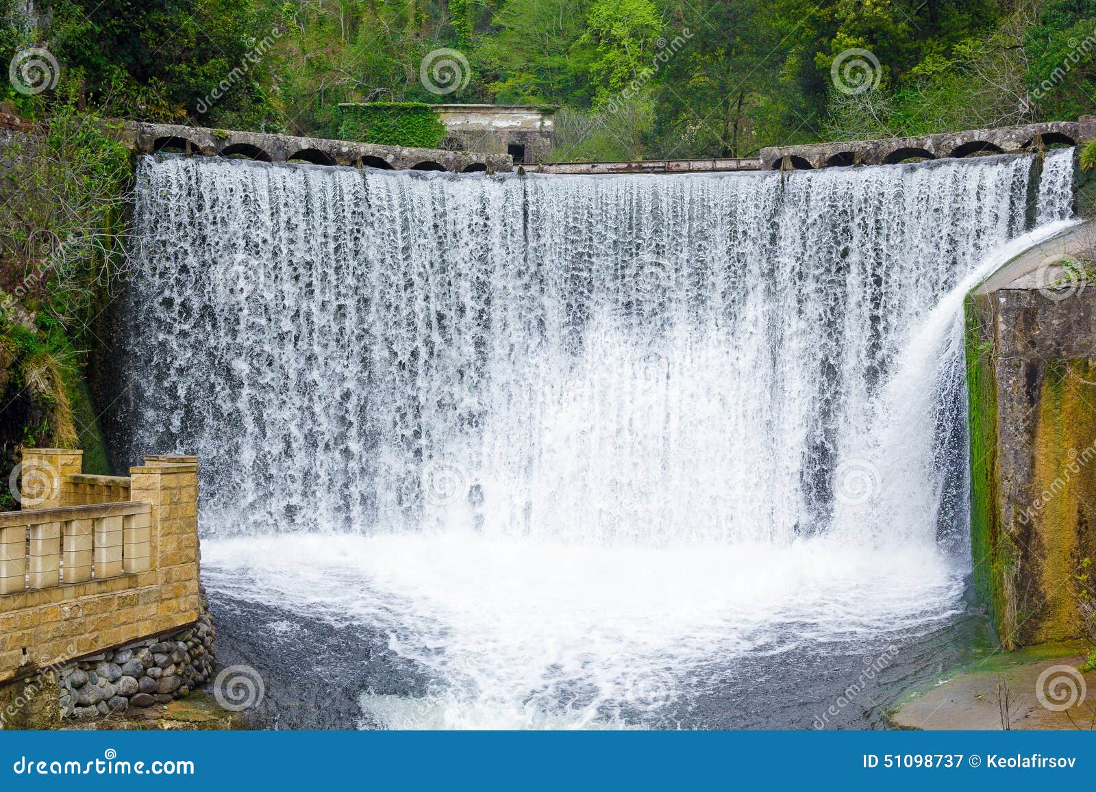 Dam waterfall in New Athos stock image. Image of light - 51098737