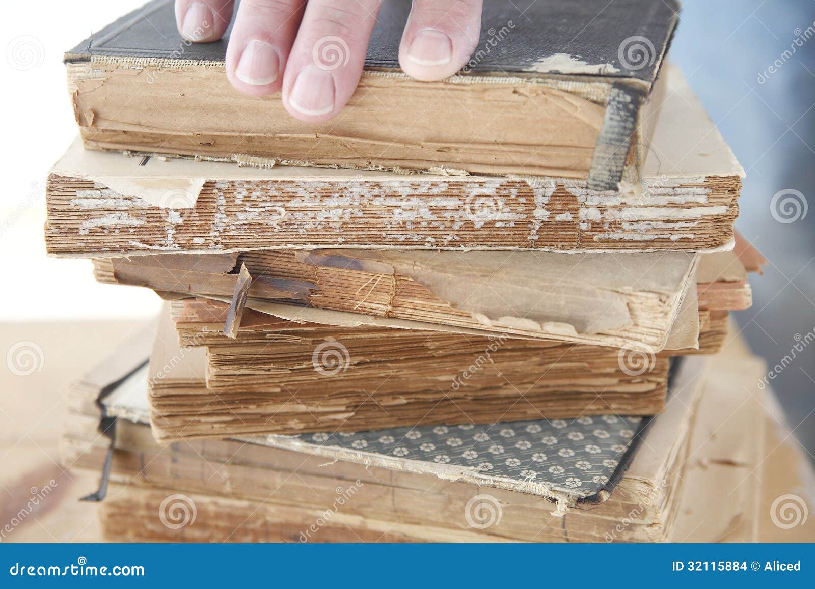Damaged Books with Hand of Man Stock Photo - Image of books, reading ...