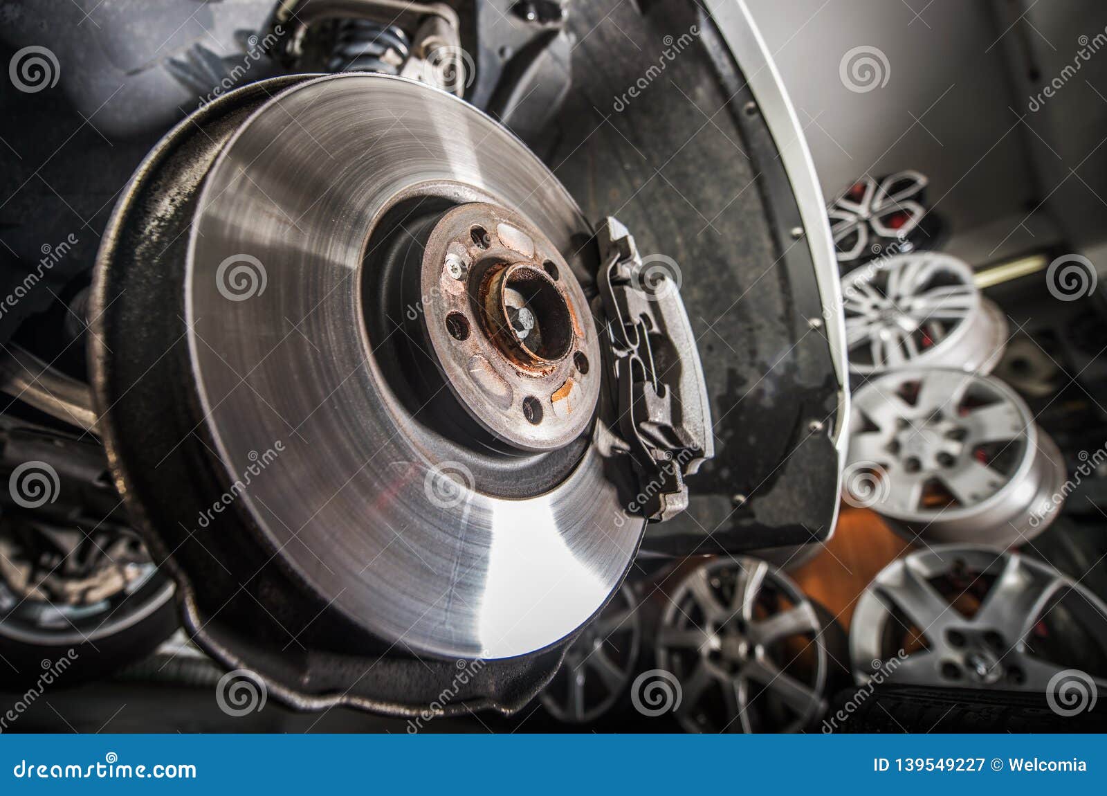 Damaged Brake Disc Replace stock image. Image of wheel - 139549227