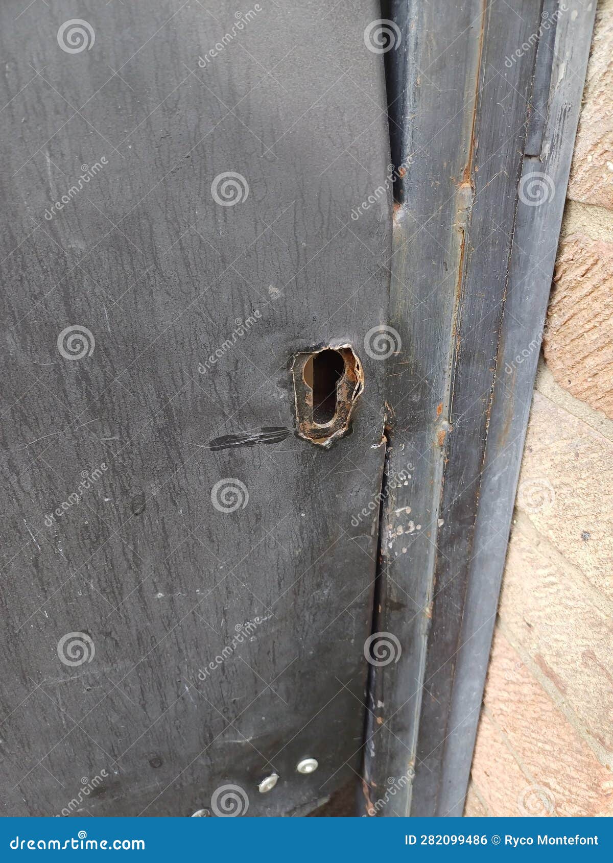 Damaged Broken Block On A Metal Gate Stock Photo | CartoonDealer.com ...