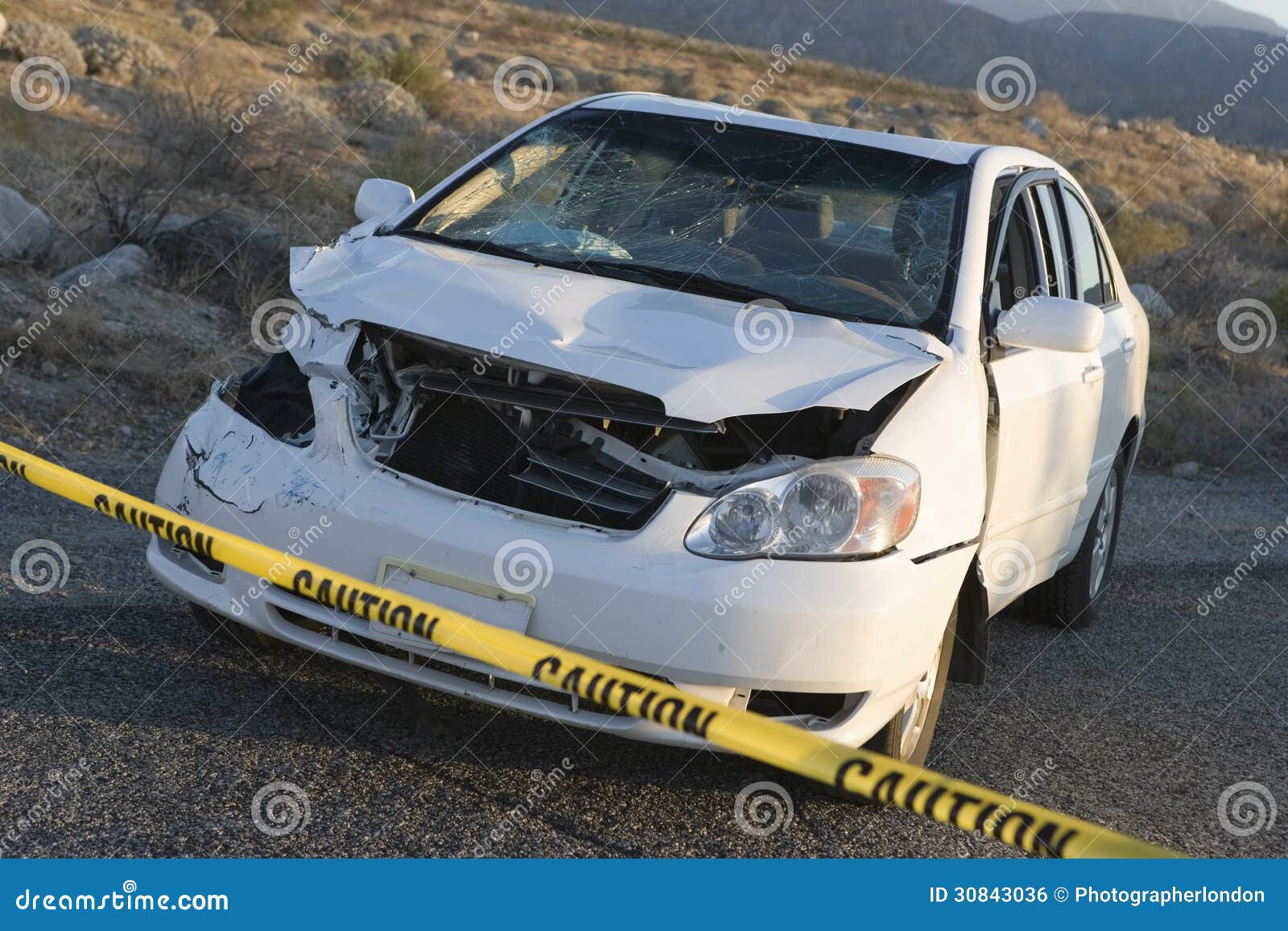 Damaged Car Behind Warning Tape Stock Photo - Image of desert, headlamp ...