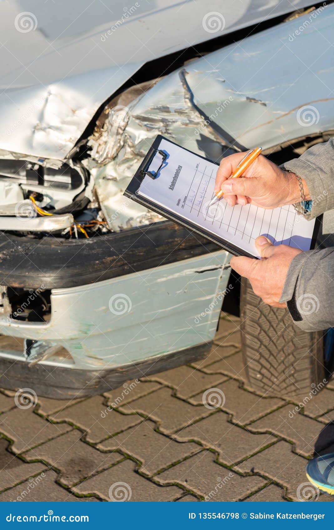 Damaged Car and Damage Assessment by an Expert Stock Photo - Image of ...