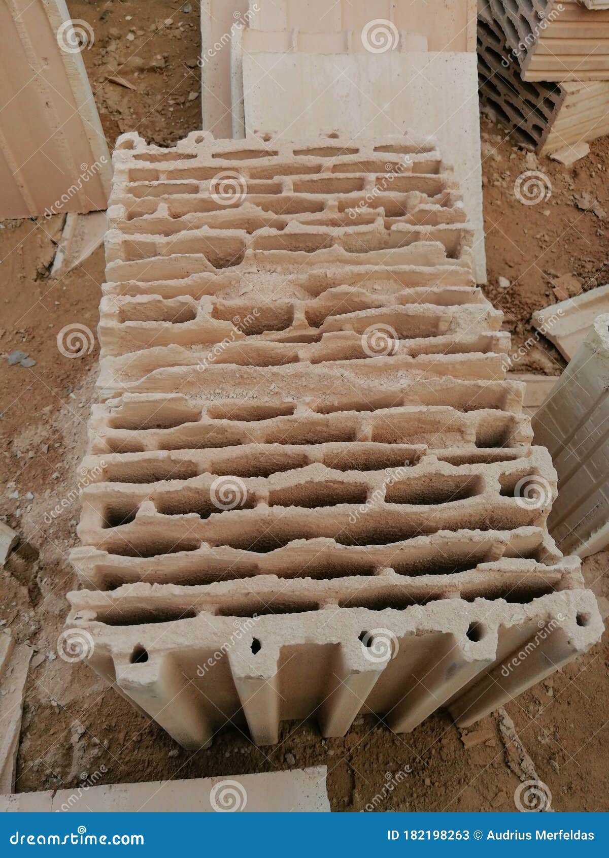Damaged Ceramic Block Of Orange Color. Ceramic Blocks. Worker Puts A ...