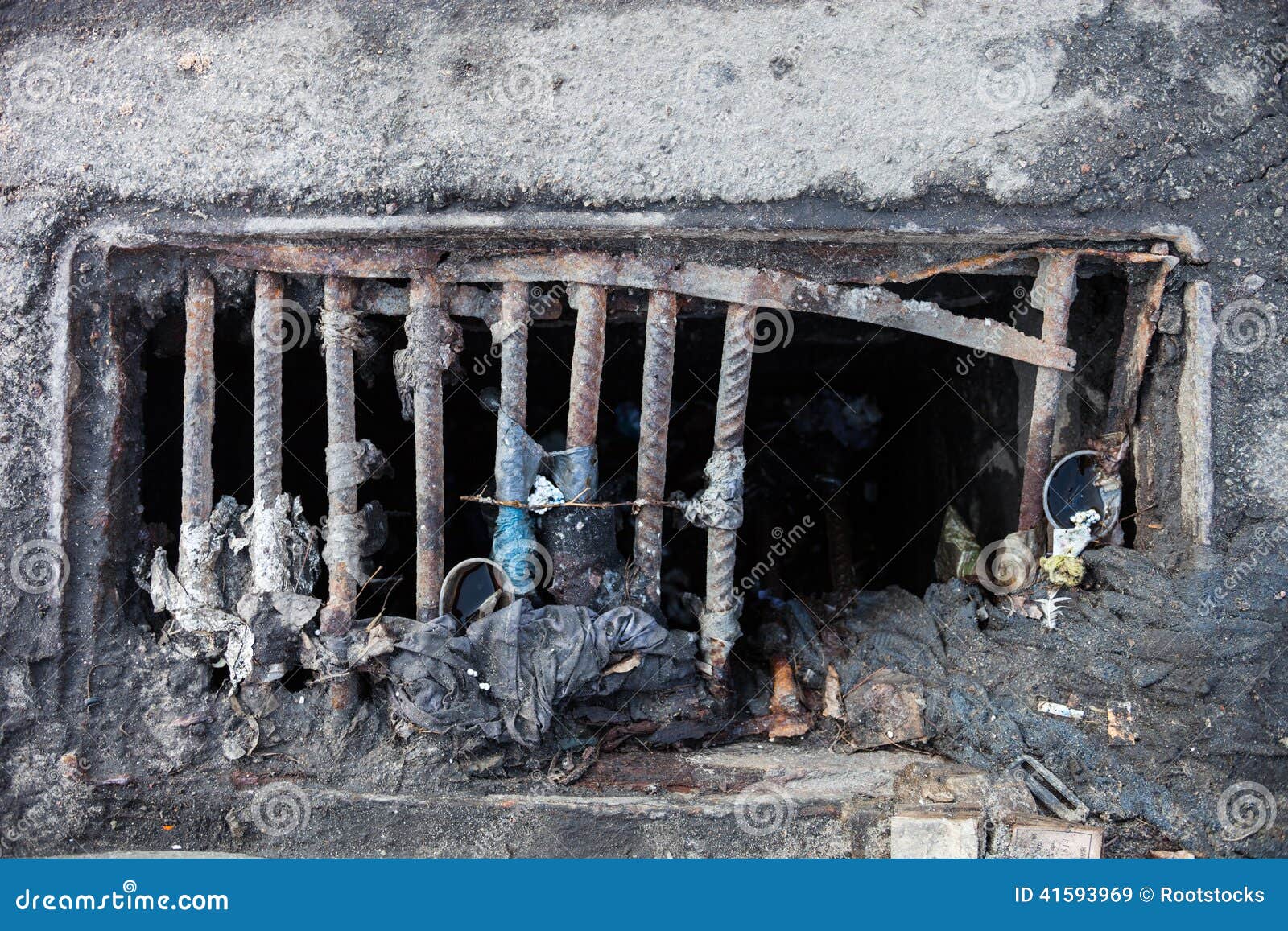 Damaged Drain Grate with the Garbage Stock Image - Image of grating ...