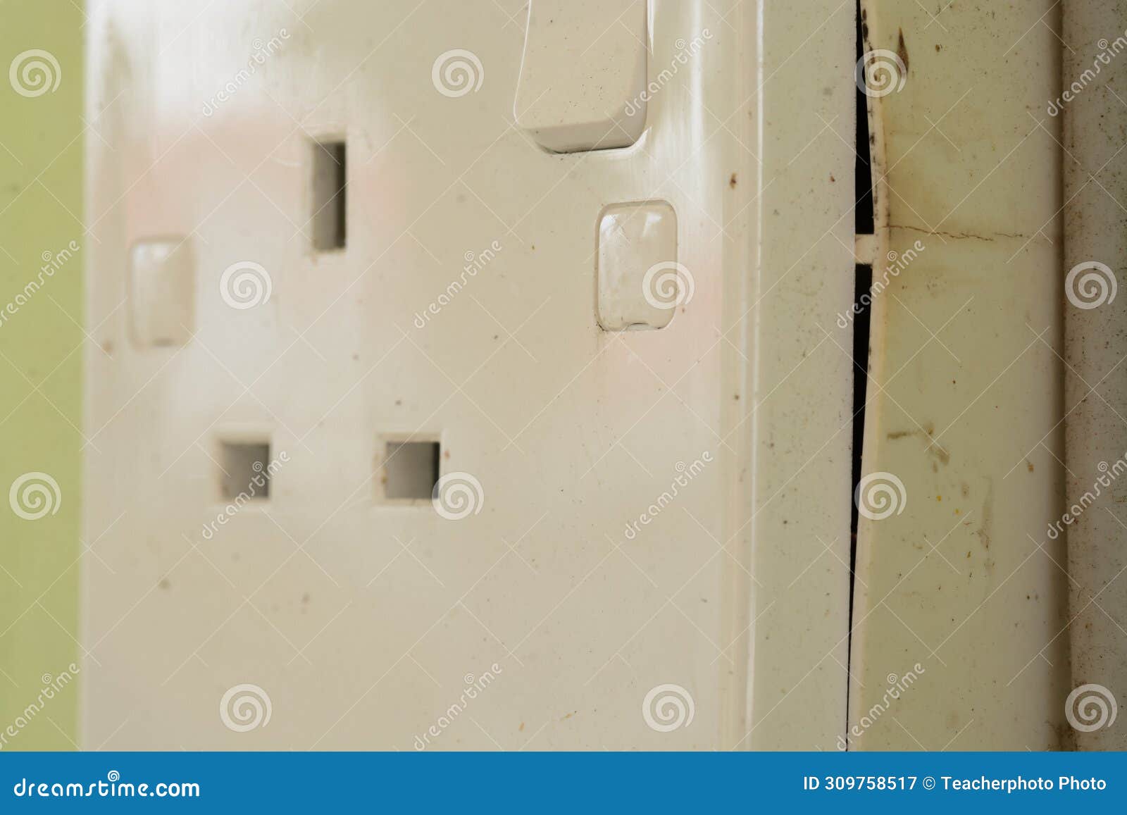 A Damaged Electrical Domestic Power Socket with Visible Cracks Poses a ...