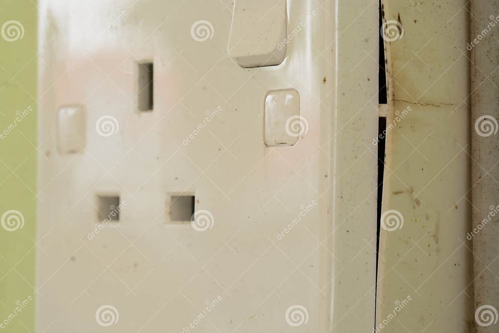 A Damaged Electrical Domestic Power Socket with Visible Cracks Poses a ...