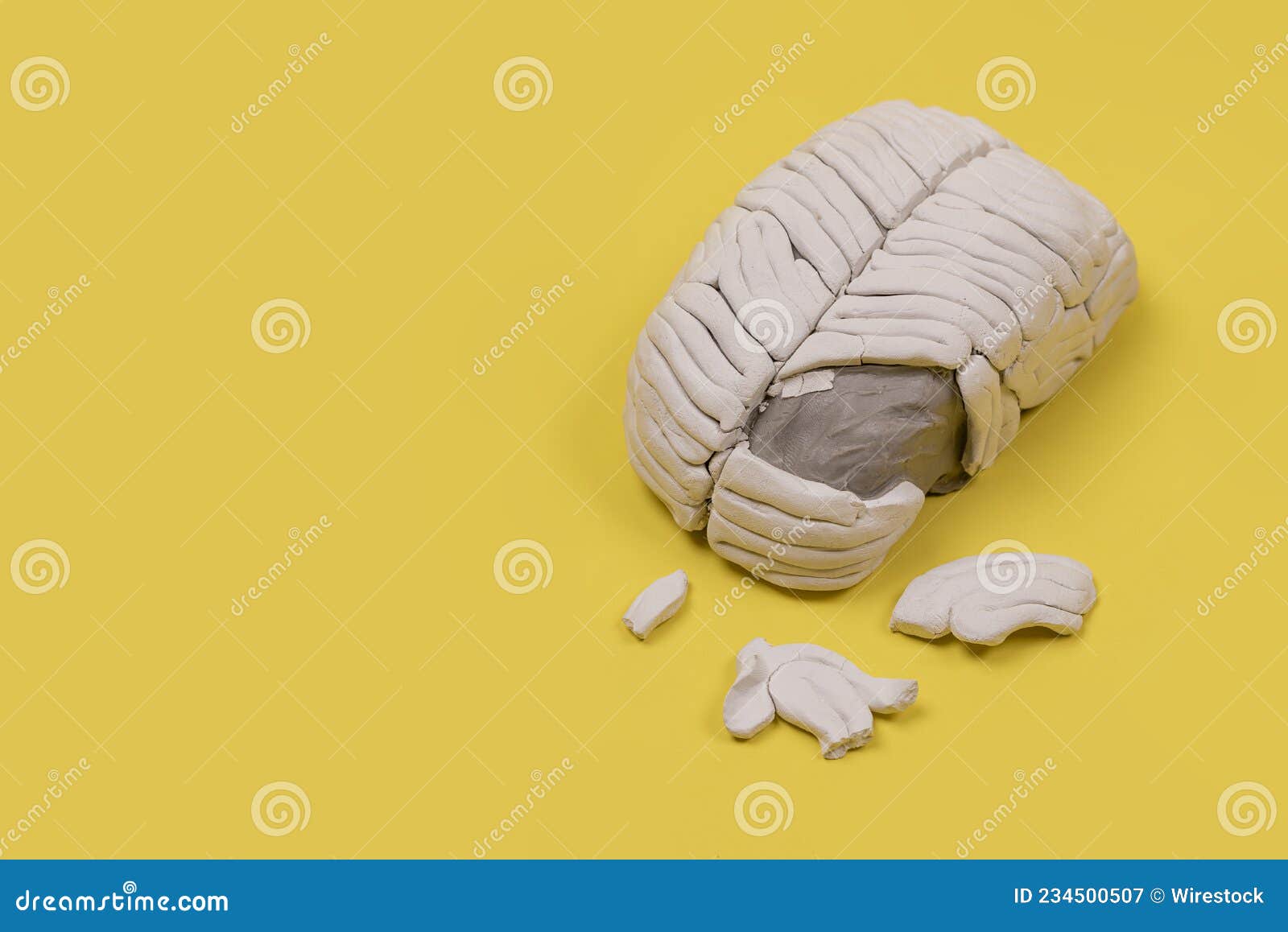 Damaged Human Brain Model on a Yellow Background Stock Image - Image of ...