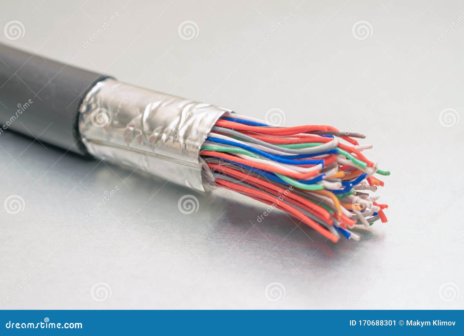 Two Damaged Stranded Wires Are In The Hands Of A Network Engineer.The ...