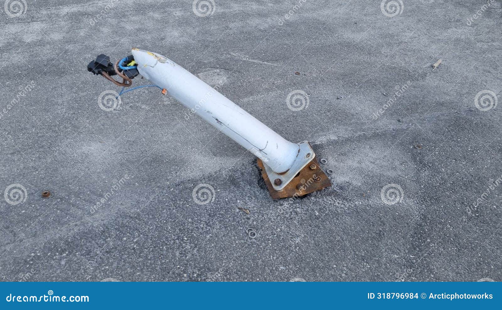 Damaged Light Pole on Black Tarmac Stock Photo - Image of ground ...