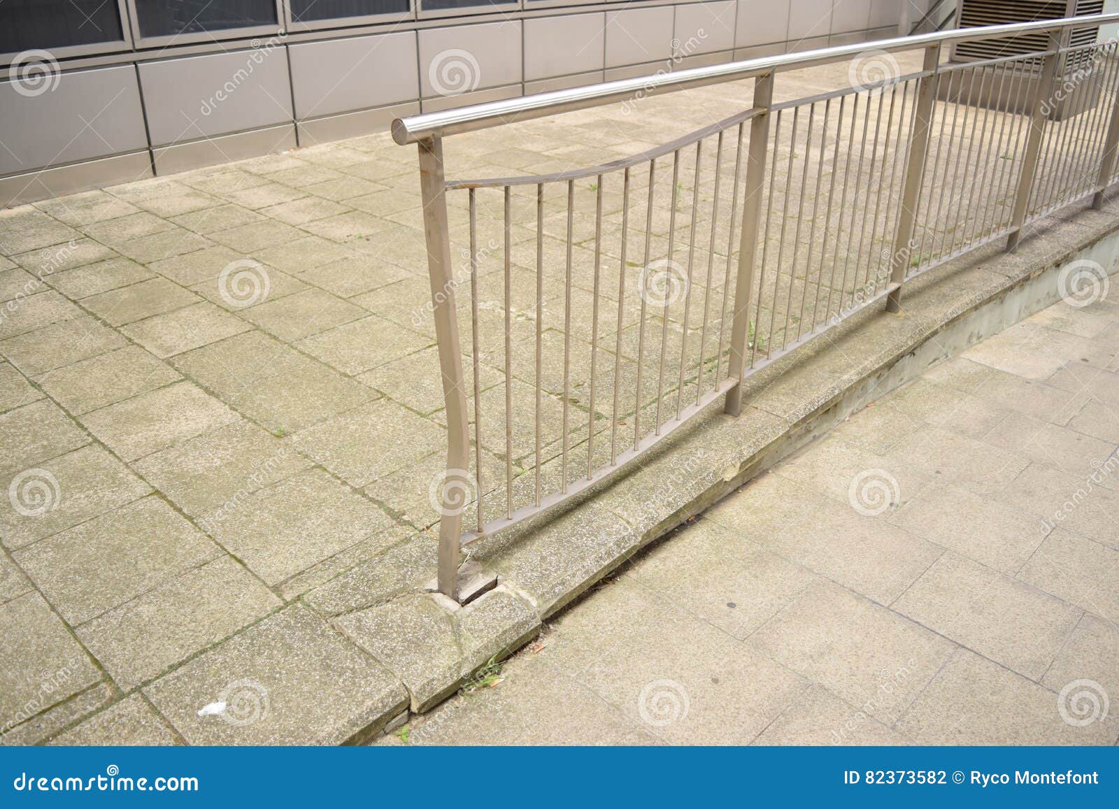 Damaged Metal Railing on the Pavement Stock Photo - Image of stainless ...