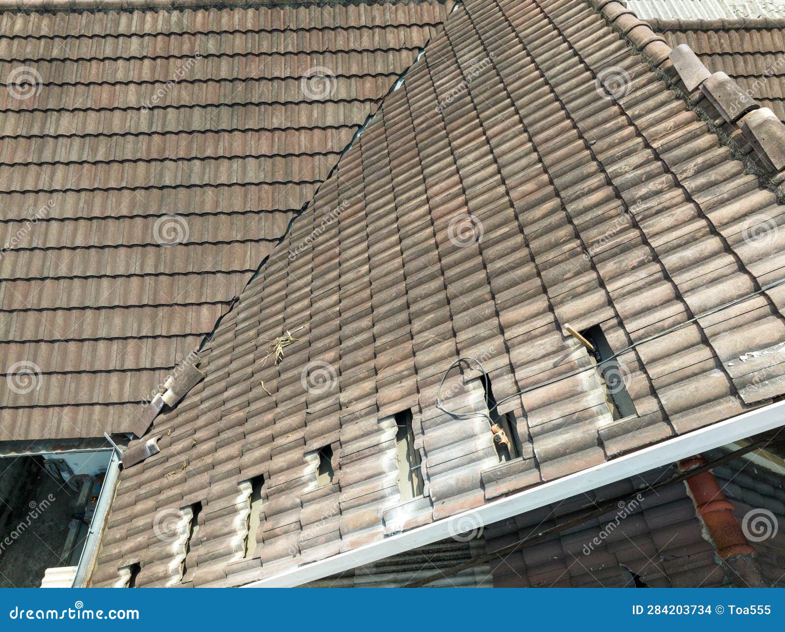 Damaged Old Roof Tile in Need of Repair. Stock Photo - Image of broken ...