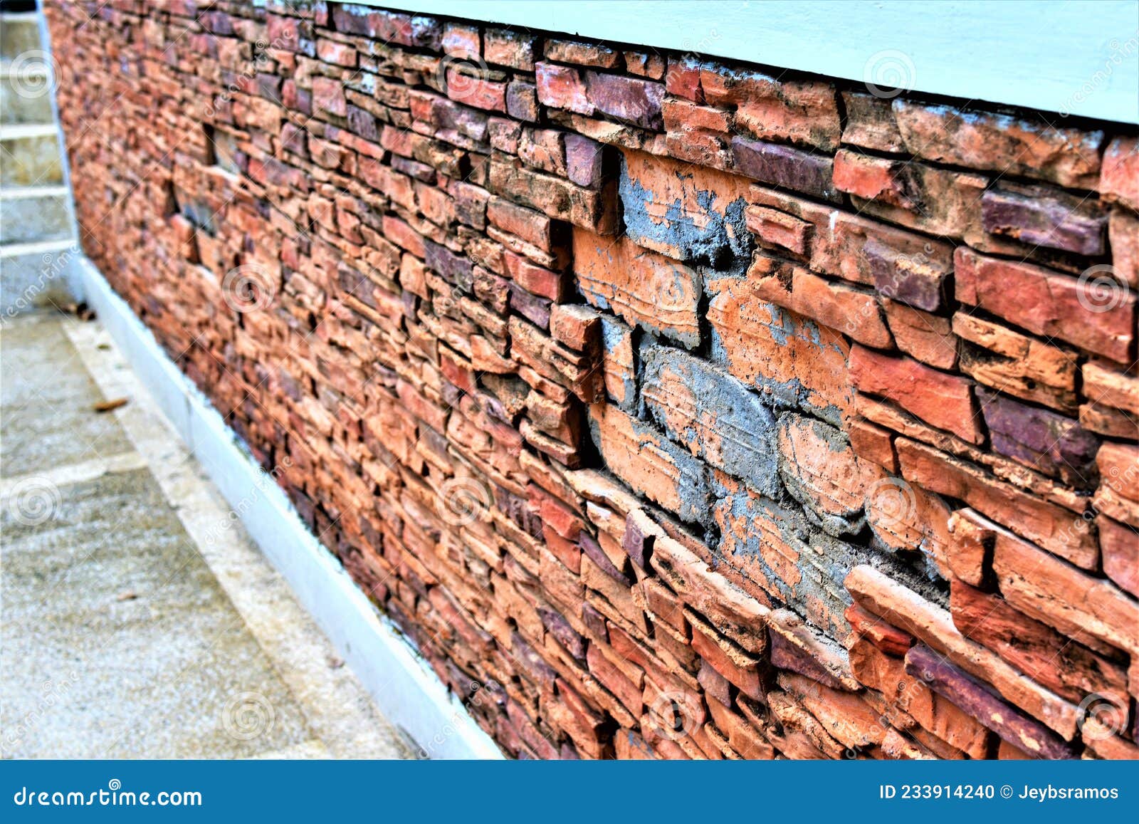 Damaged Red Brick Wall with Missing Bricks Stock Photo - Image of ...