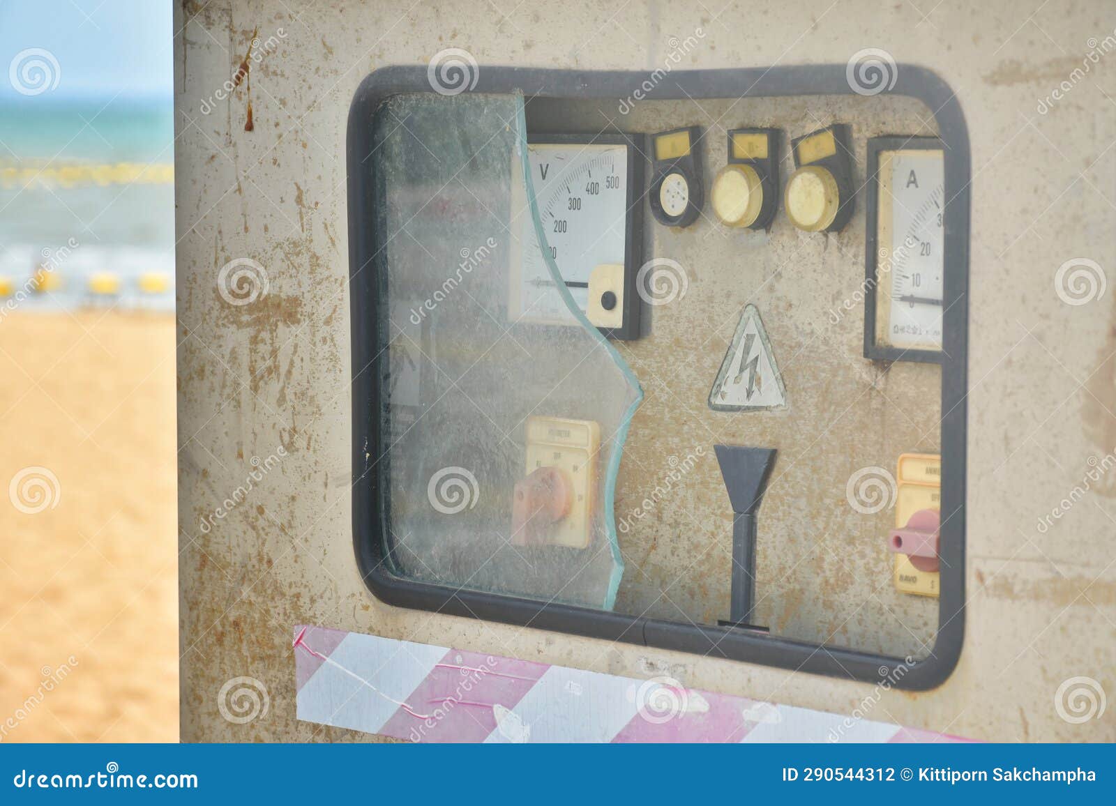 A Damaged and Rusted Electrical Control Panel Has Broken Glass Shards ...