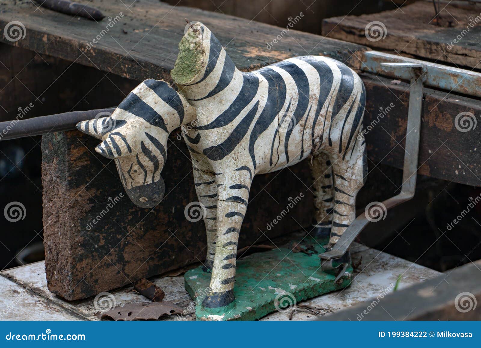 The Damaged Statue of Zebra with a Falling Head Stock Photo - Image of ...